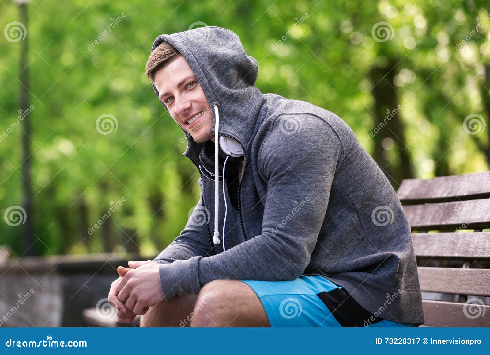 Smiling Man Sitting on the Bench Stock Image - Image of enjoying ...