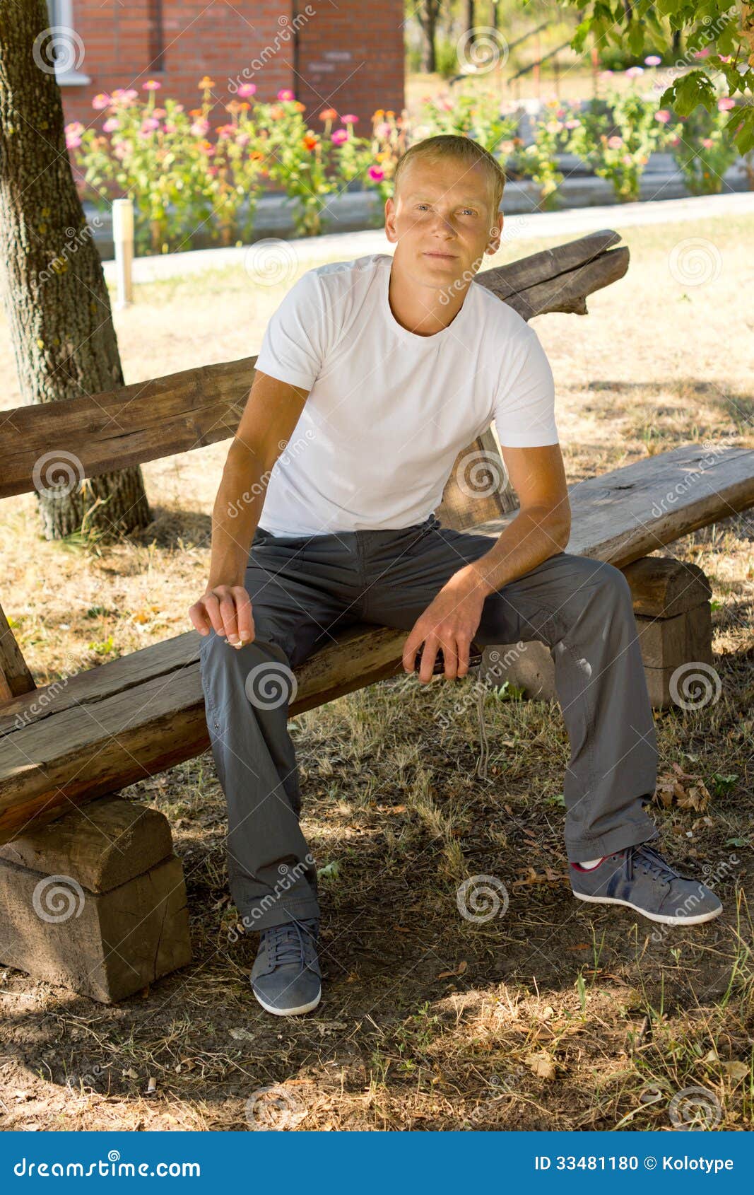 Smiling Man Sitting on a Park Bench Stock Photo - Image of meditative ...