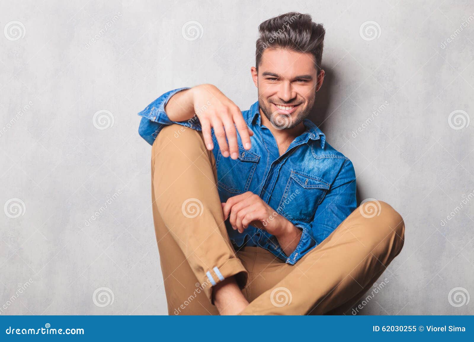 Smiling Man Sitting In Studio Background Legs Crossed Posing Royalty ...