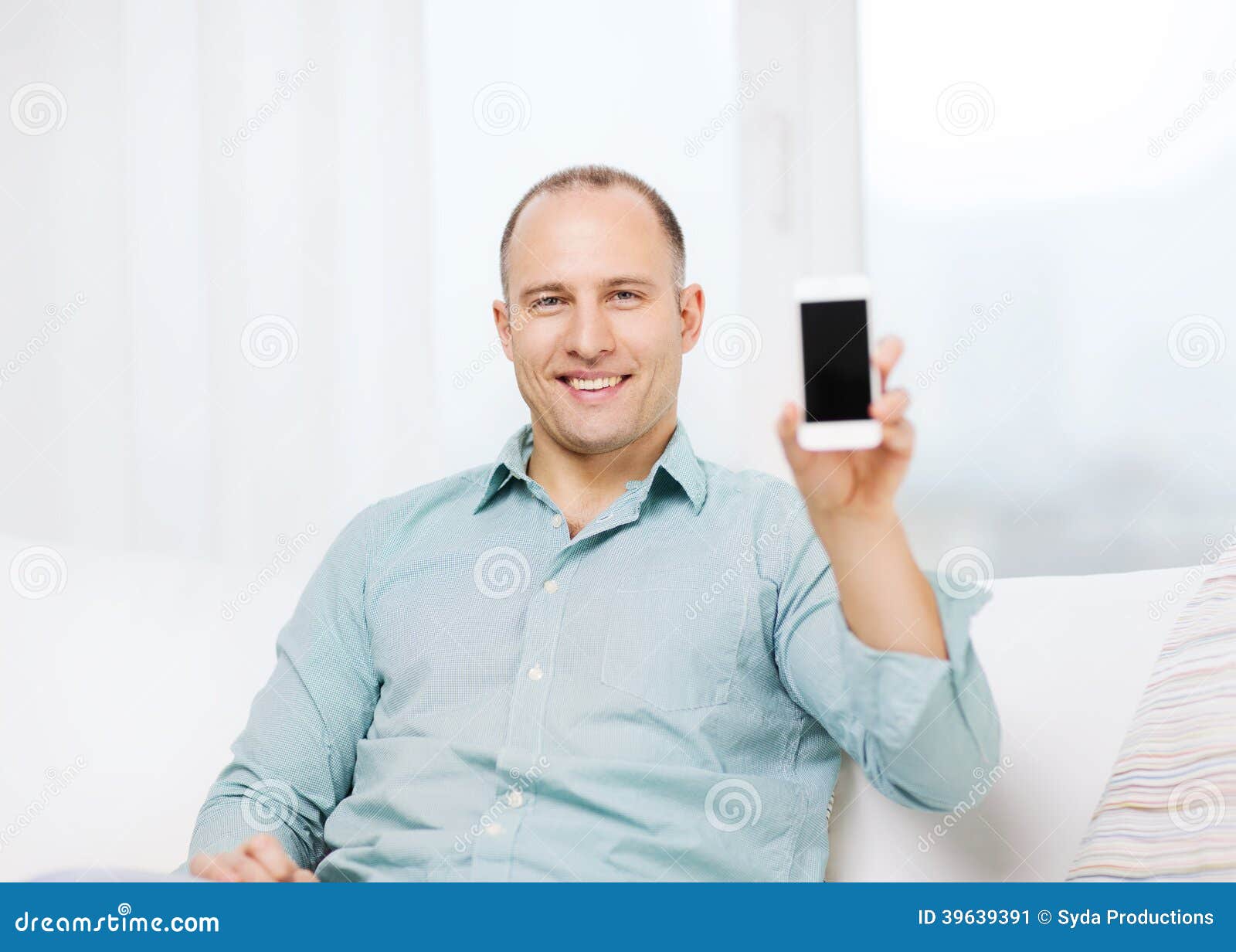 Smiling Man with Smartphone at Home Stock Image - Image of internet ...