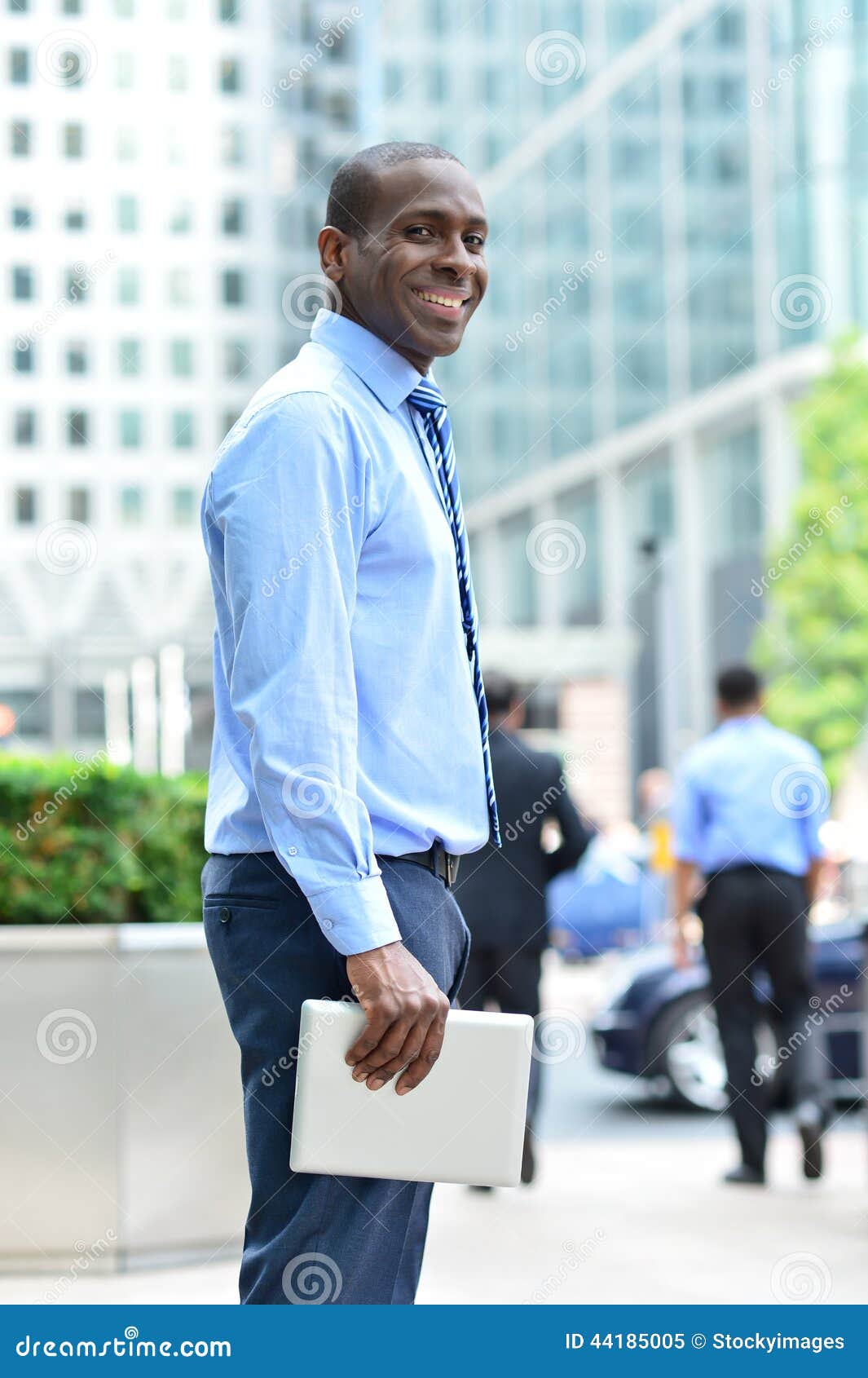 Smiling Man Standing Outside Offices Building Stock Image - Image of ...