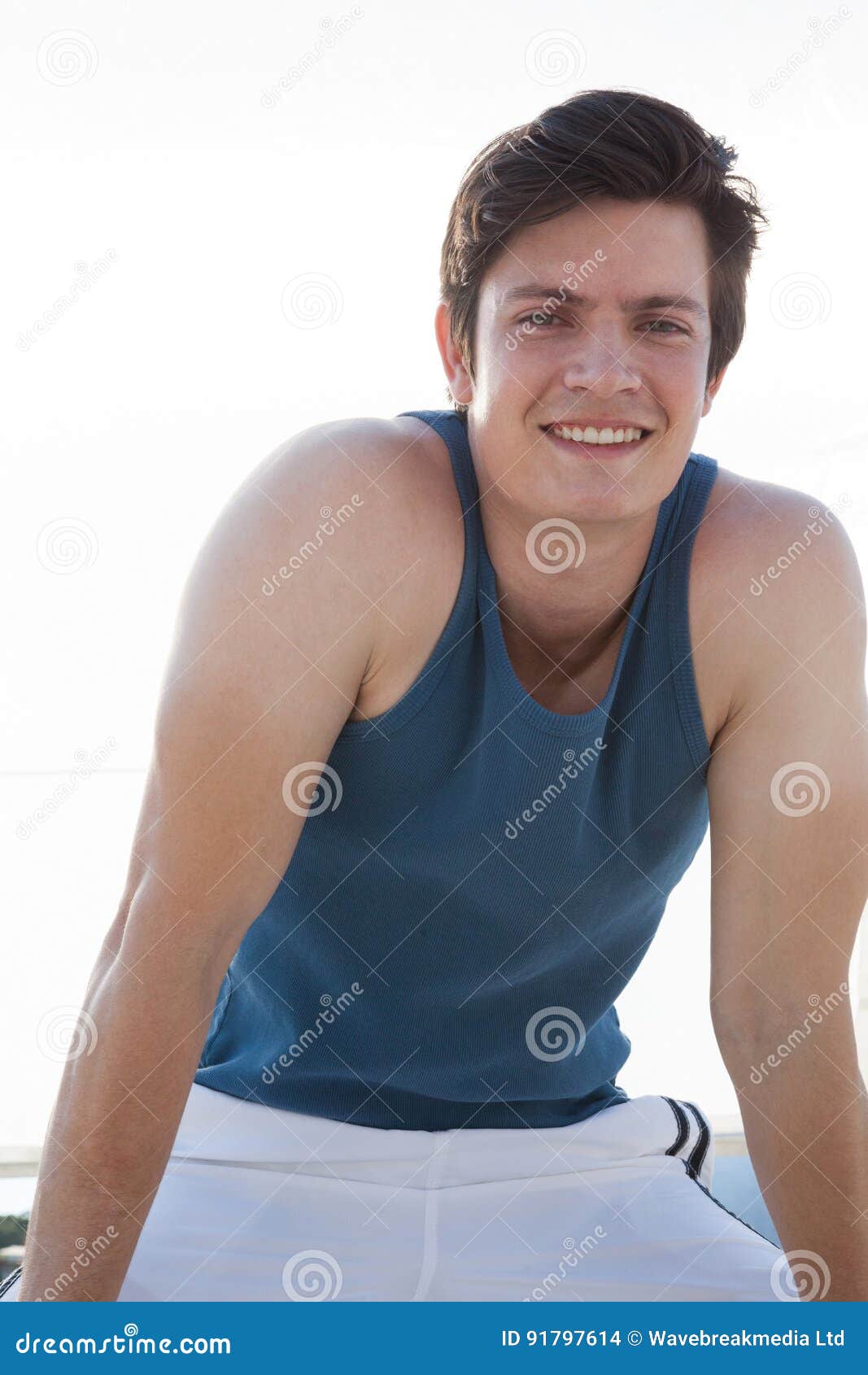 Smiling Man Taking Break after Jogging on Beach Stock Photo - Image of ... Smiling Man Taking Break after Jogging on Beach Stock Photo - Image of ...