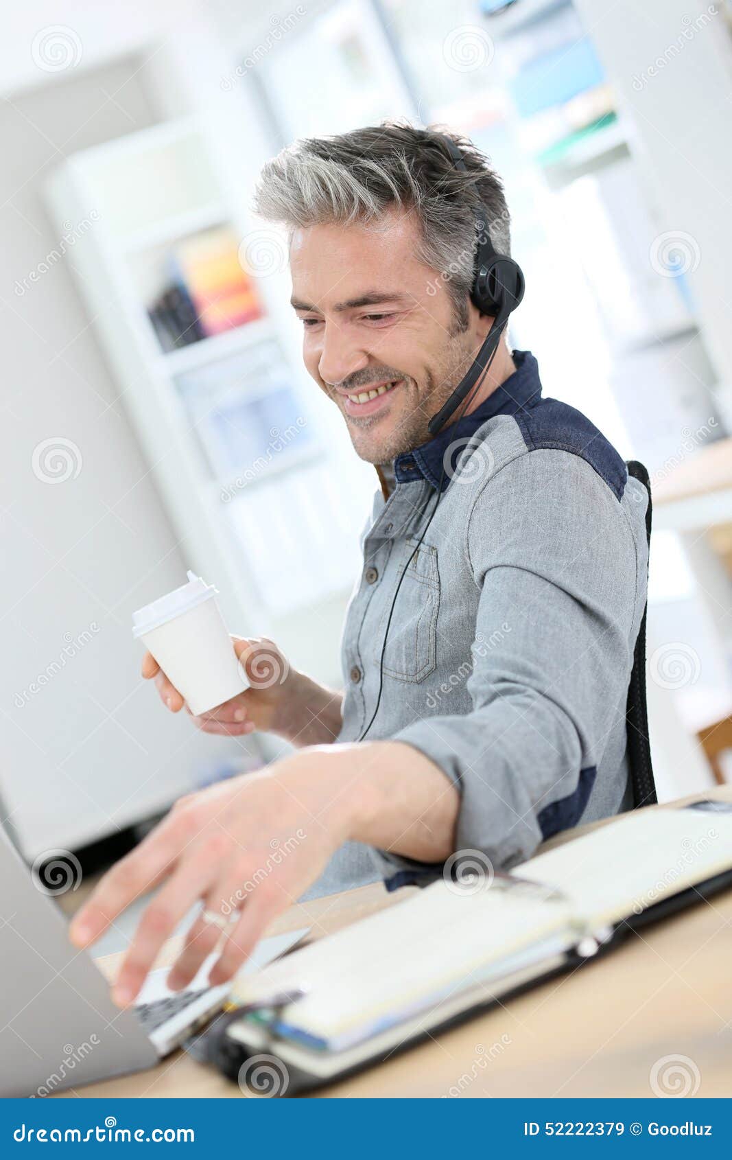 Smiling Man Teleworking from Home with Laptop Stock Image - Image of ...