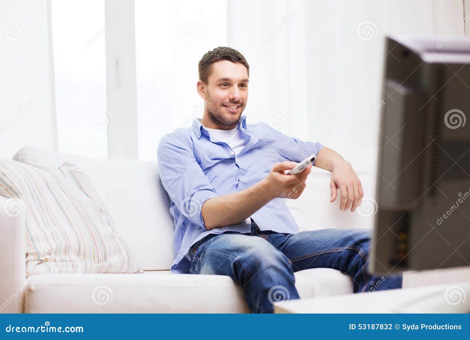 Smiling Man with Tv Remote Control at Home Stock Photo - Image of news ...