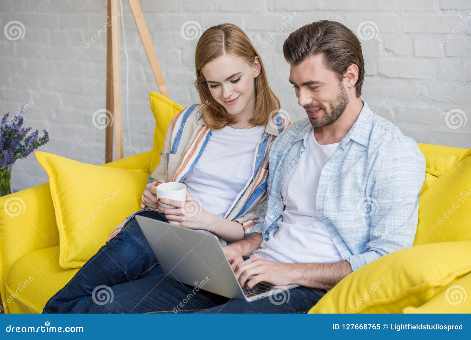 Smiling Man Typing on Laptop and Girlfriend Stock Image - Image of ...