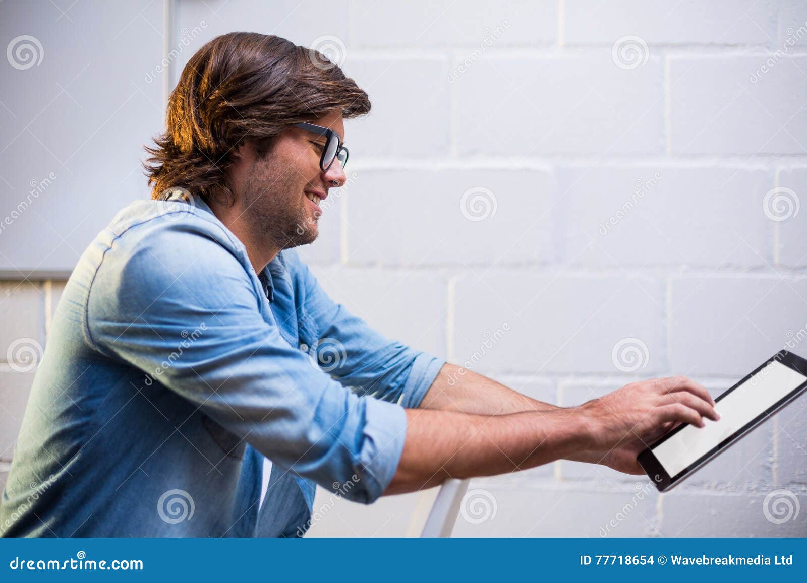 Smiling Man Using Digital Tablet Stock Photo - Image of male, cool ...