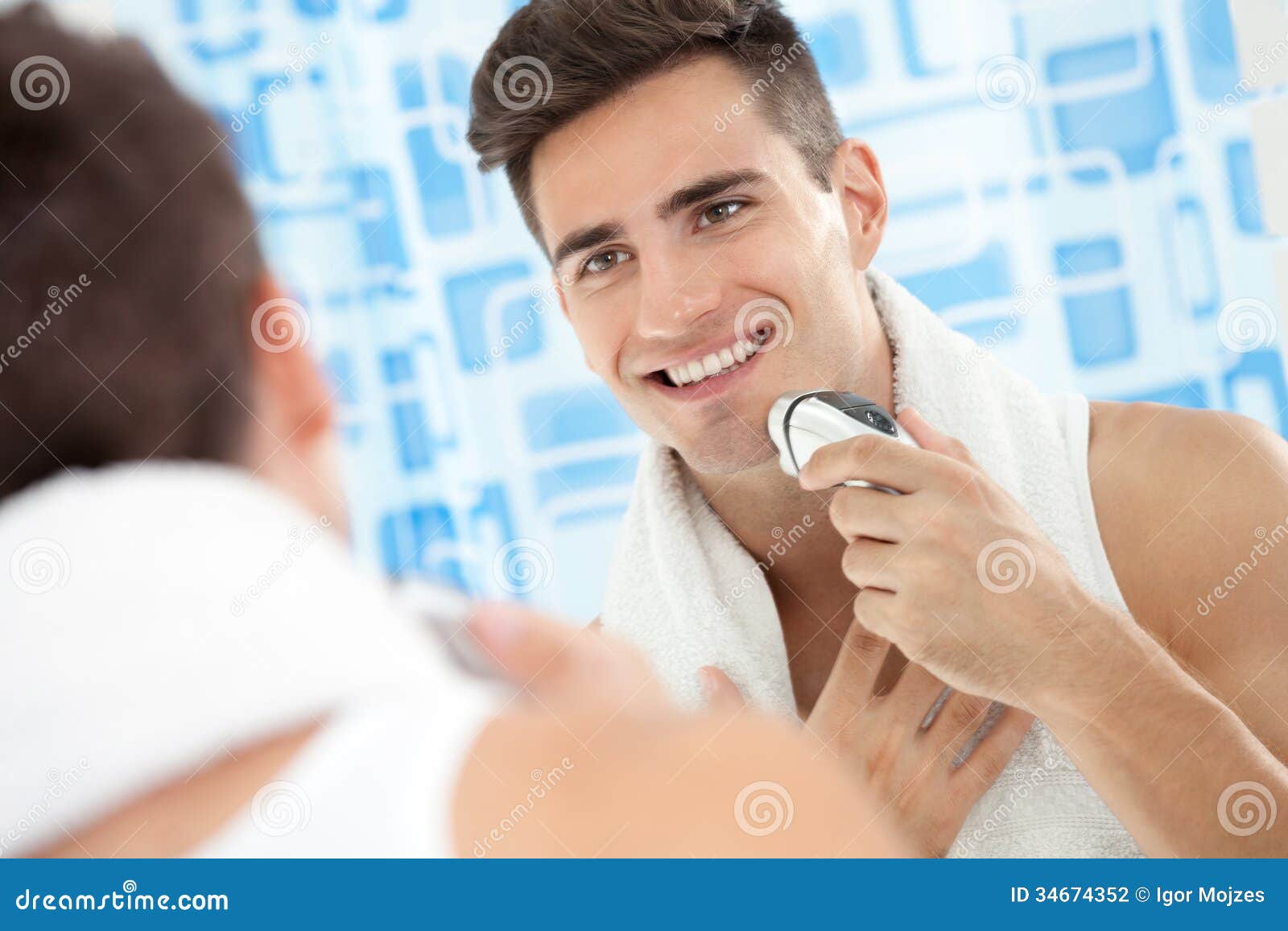 Smiling Man Using Electric Shaver Stock Photo - Image of naked ...