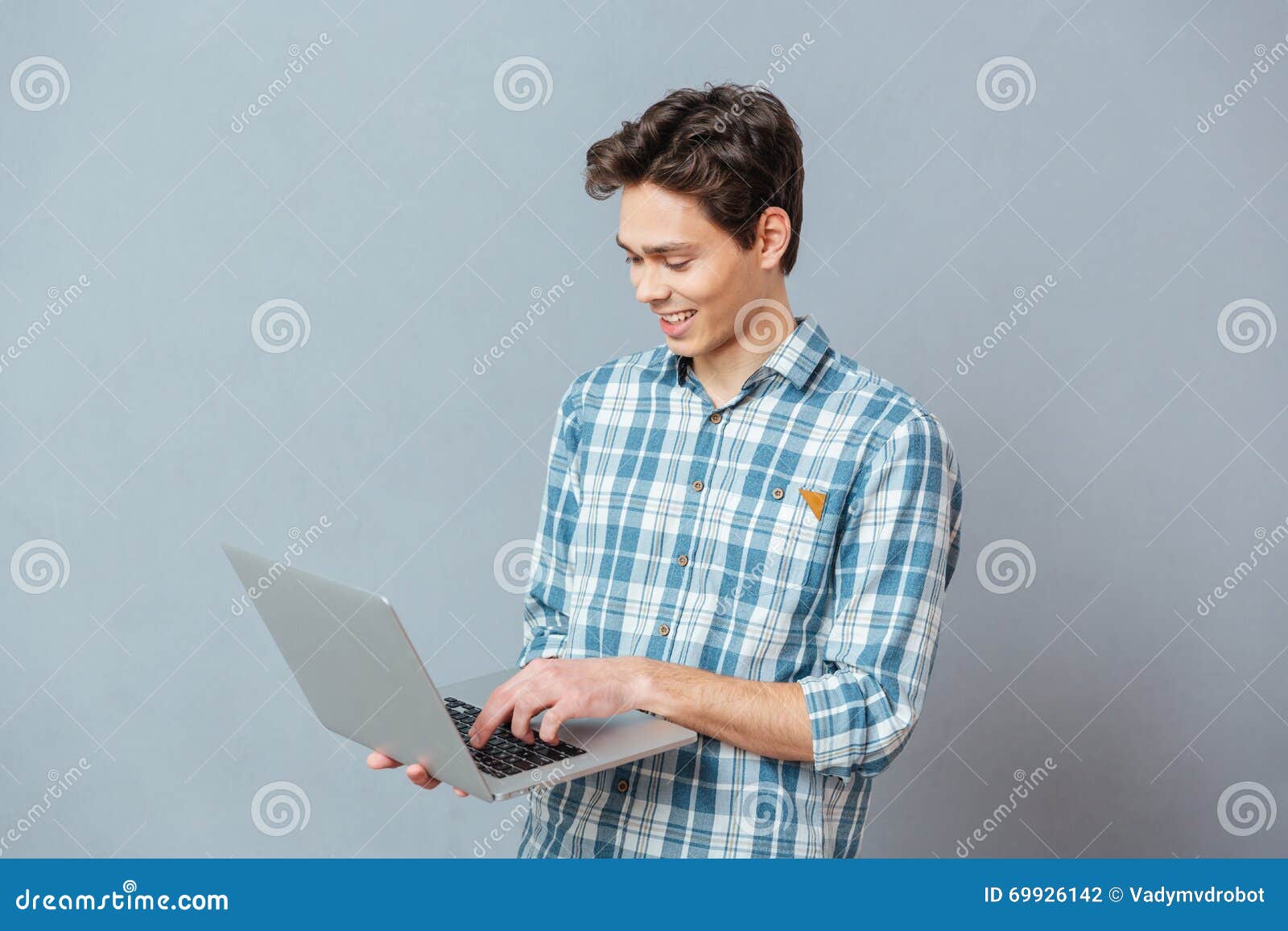Smiling Man Using Laptop Computer Stock Photo - Image of leisure ...