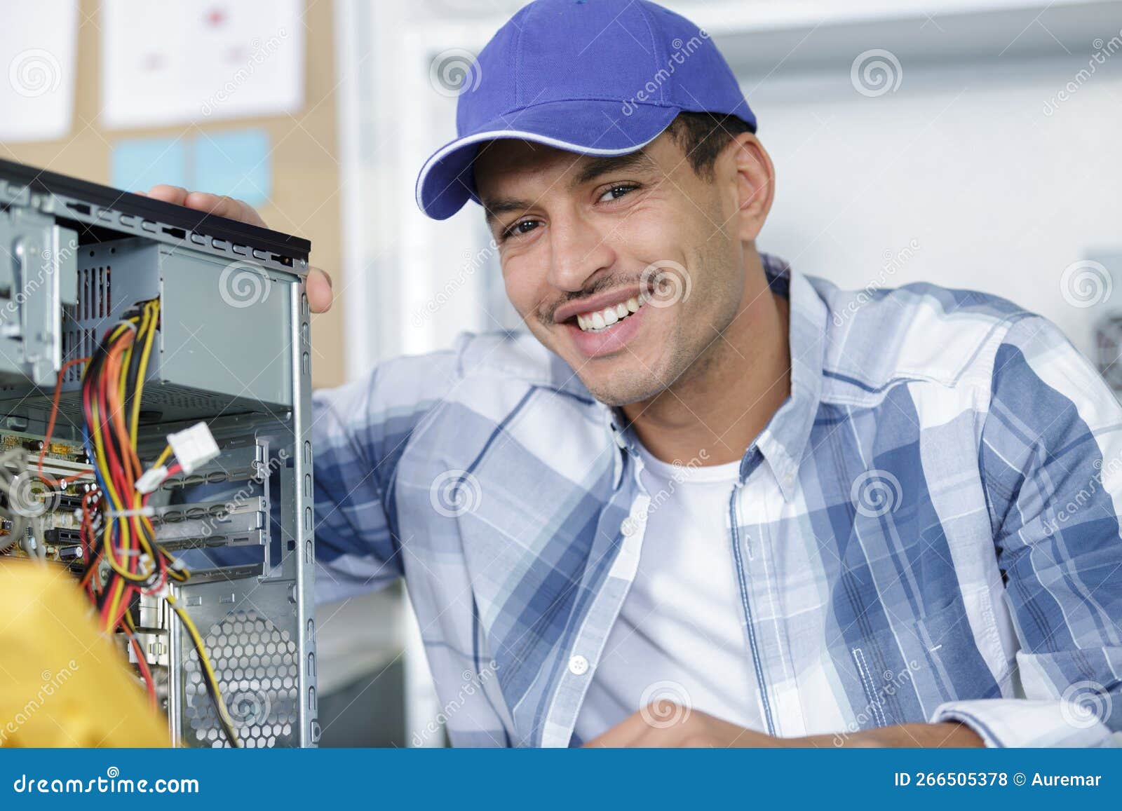 Smiling Man Using Multimeter while Fixing Pc Stock Photo - Image of ...