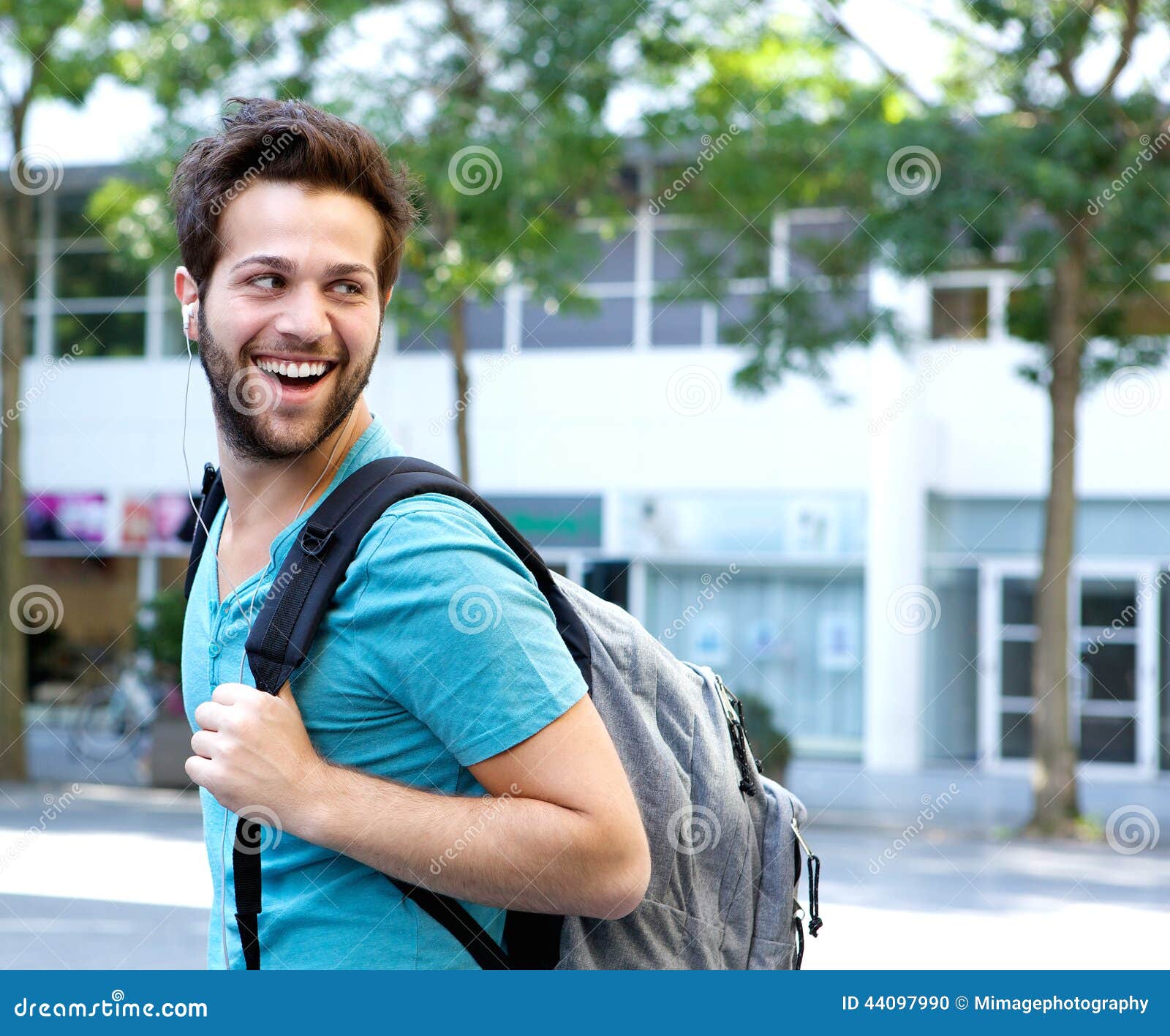 Smiling Man Walking with Bag Outdoors Stock Photo - Image of enjoy ...