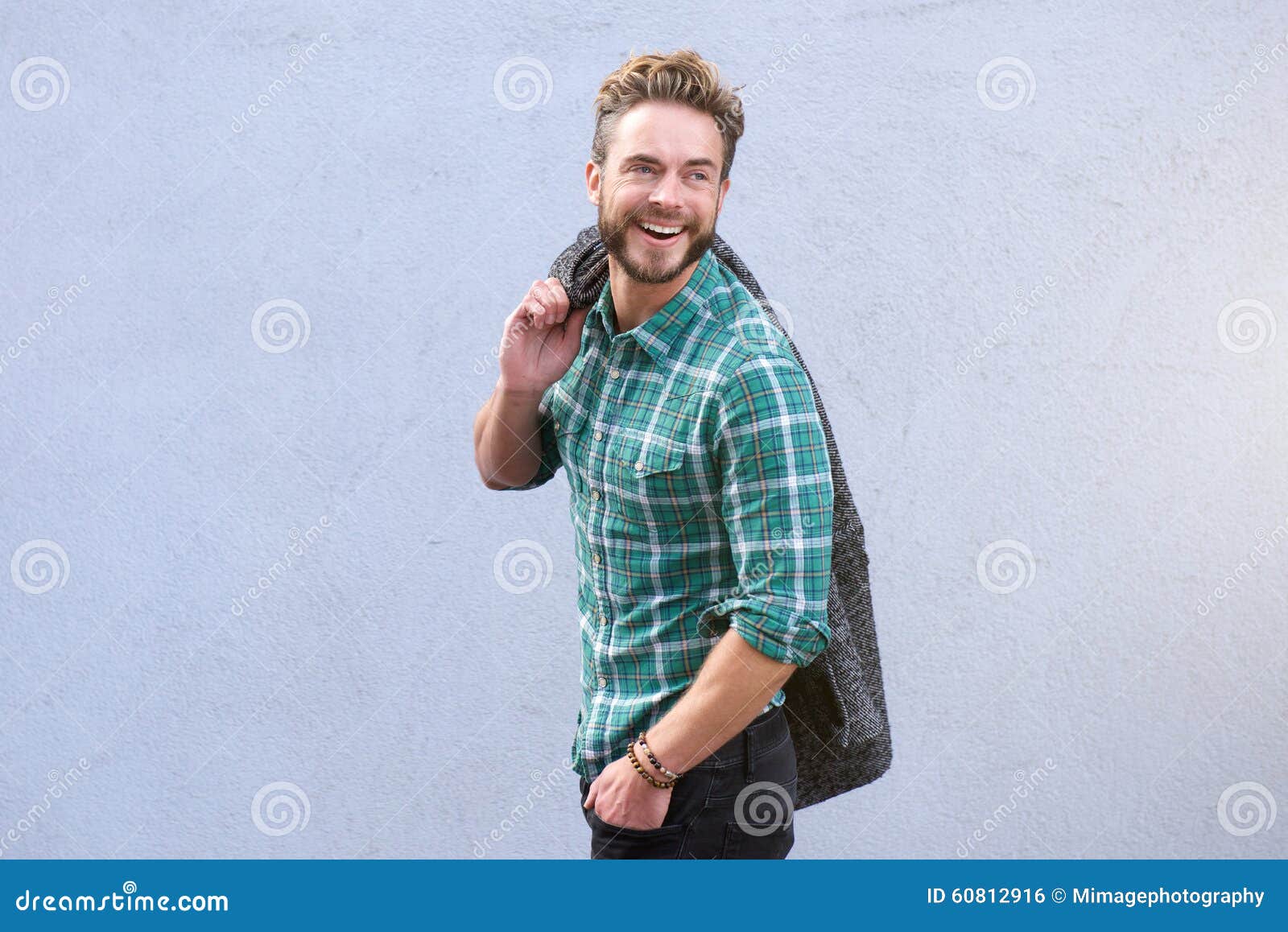 Smiling Man Walking Looking Over Shoulder Stock Photo - Image of copy ...