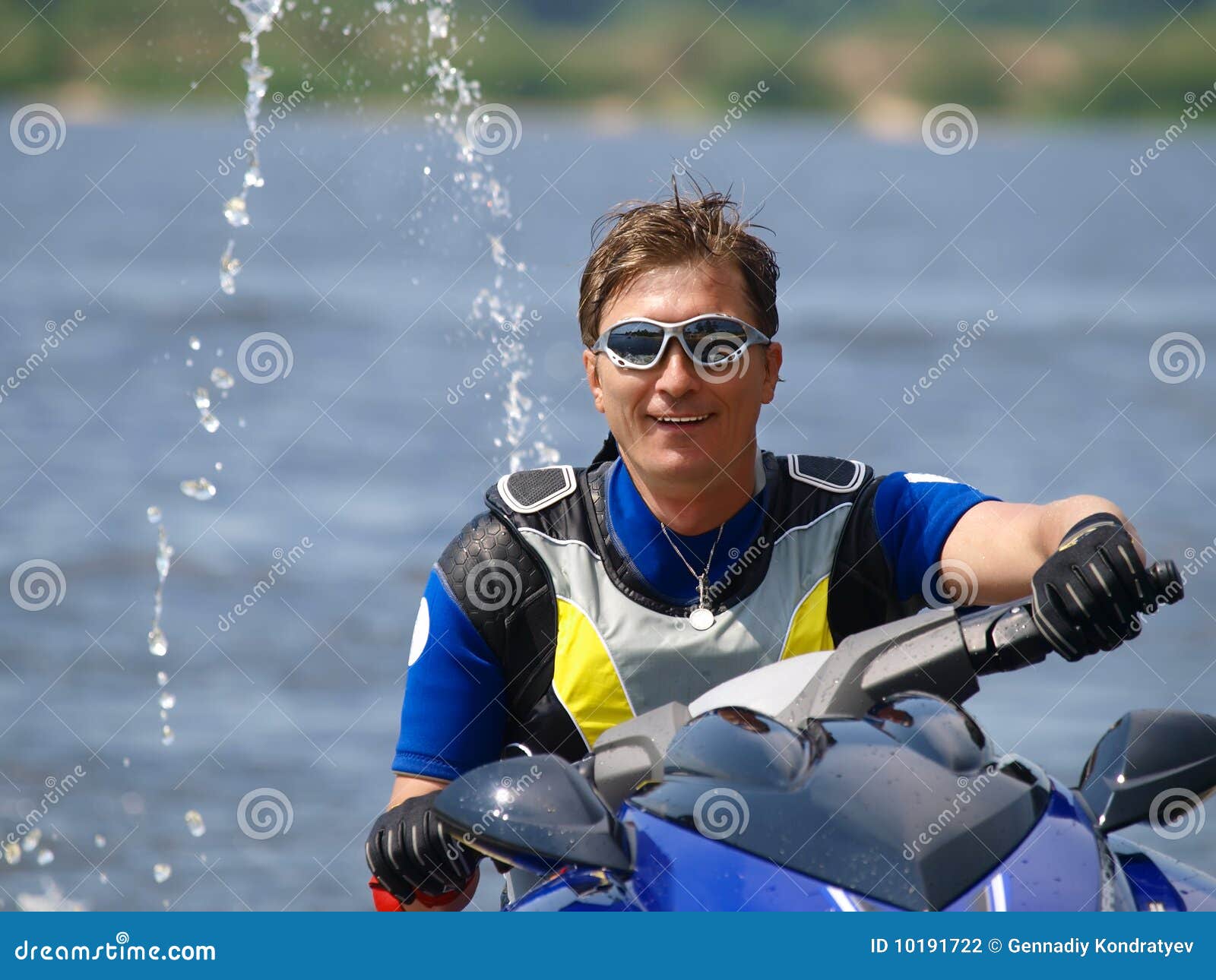 Smiling man on Wave Runner stock photo. Image of adrenaline - 10191722
