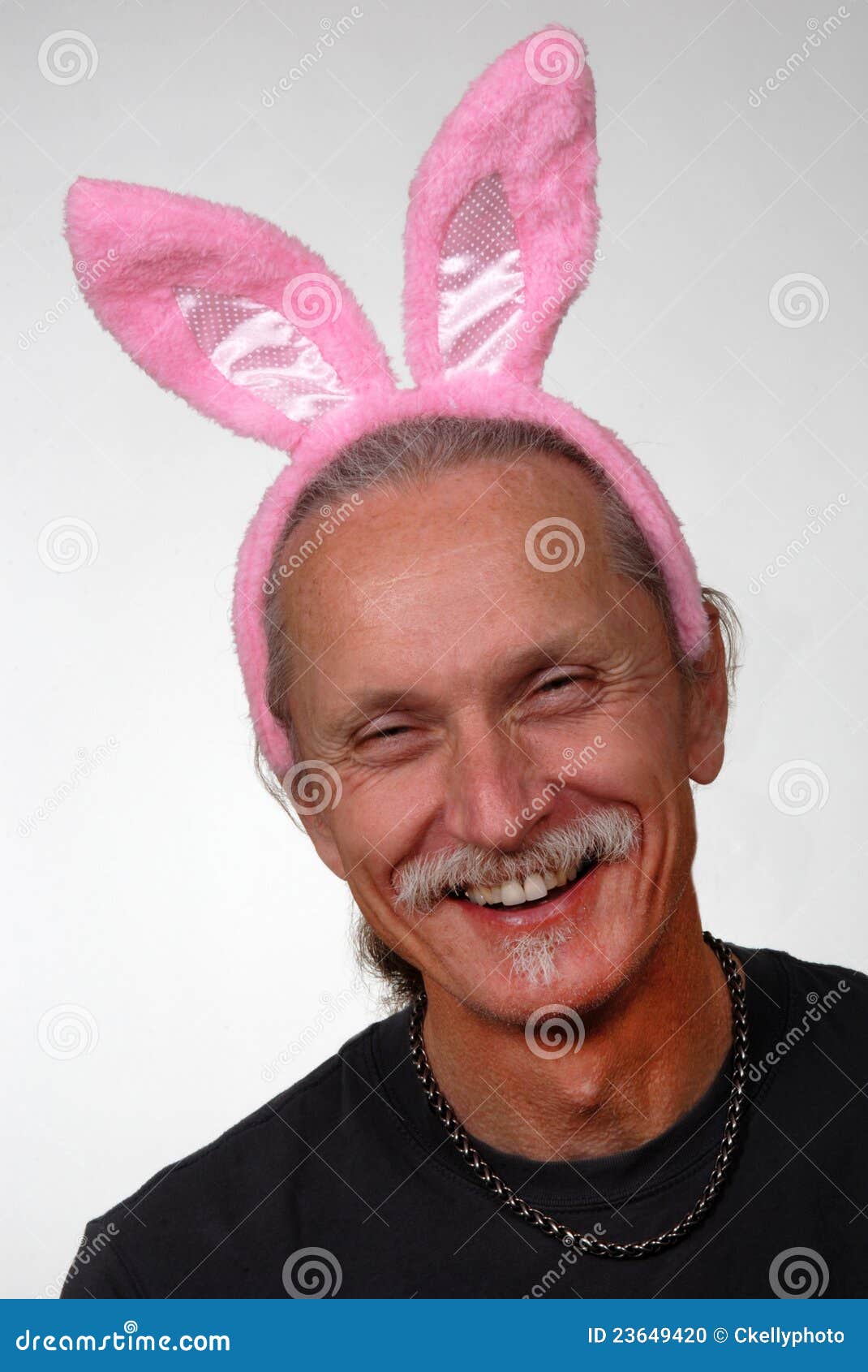 Smiling Man Wearing Rabbit Ears Stock Photo - Image of shirt, goofy ...