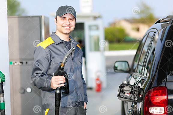 Smiling Man at Work at a Gas Station Stock Image - Image of power ...