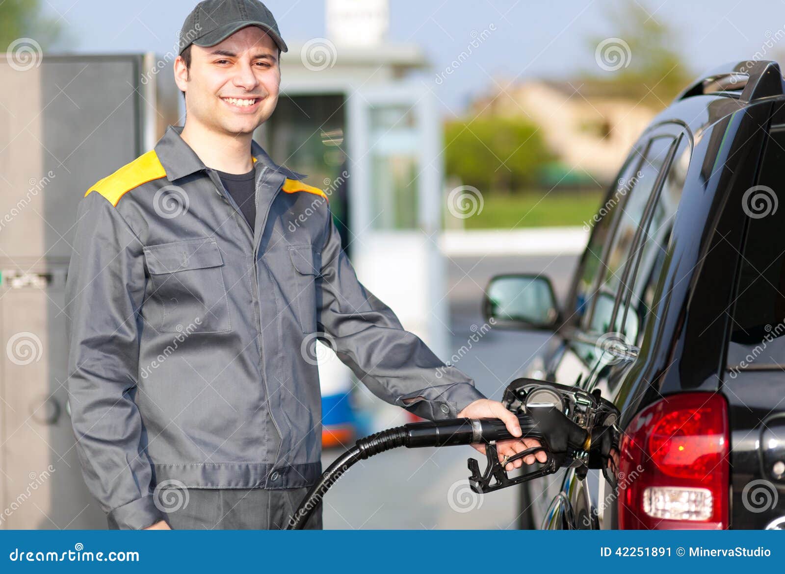 Smiling Man at Work at a Gas Station Stock Image - Image of ...