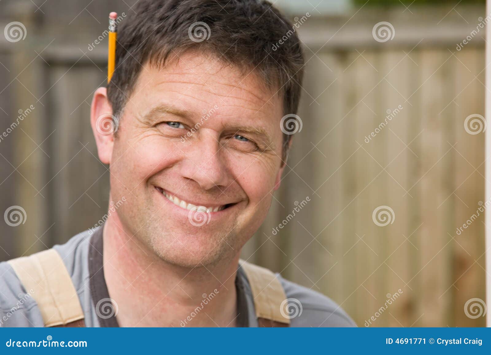 Smiling Man Worker stock image. Image of grey, construction - 4691771