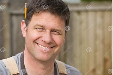 Smiling Man Worker stock image. Image of grey, construction - 4691771