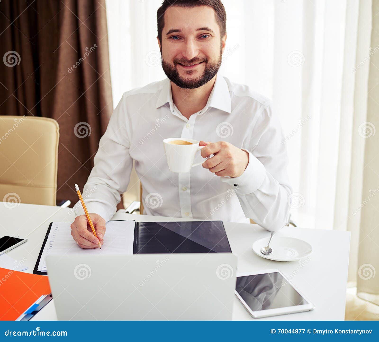 Smiling Man Working and Drink a Coffee in the White Office Stock Image ...