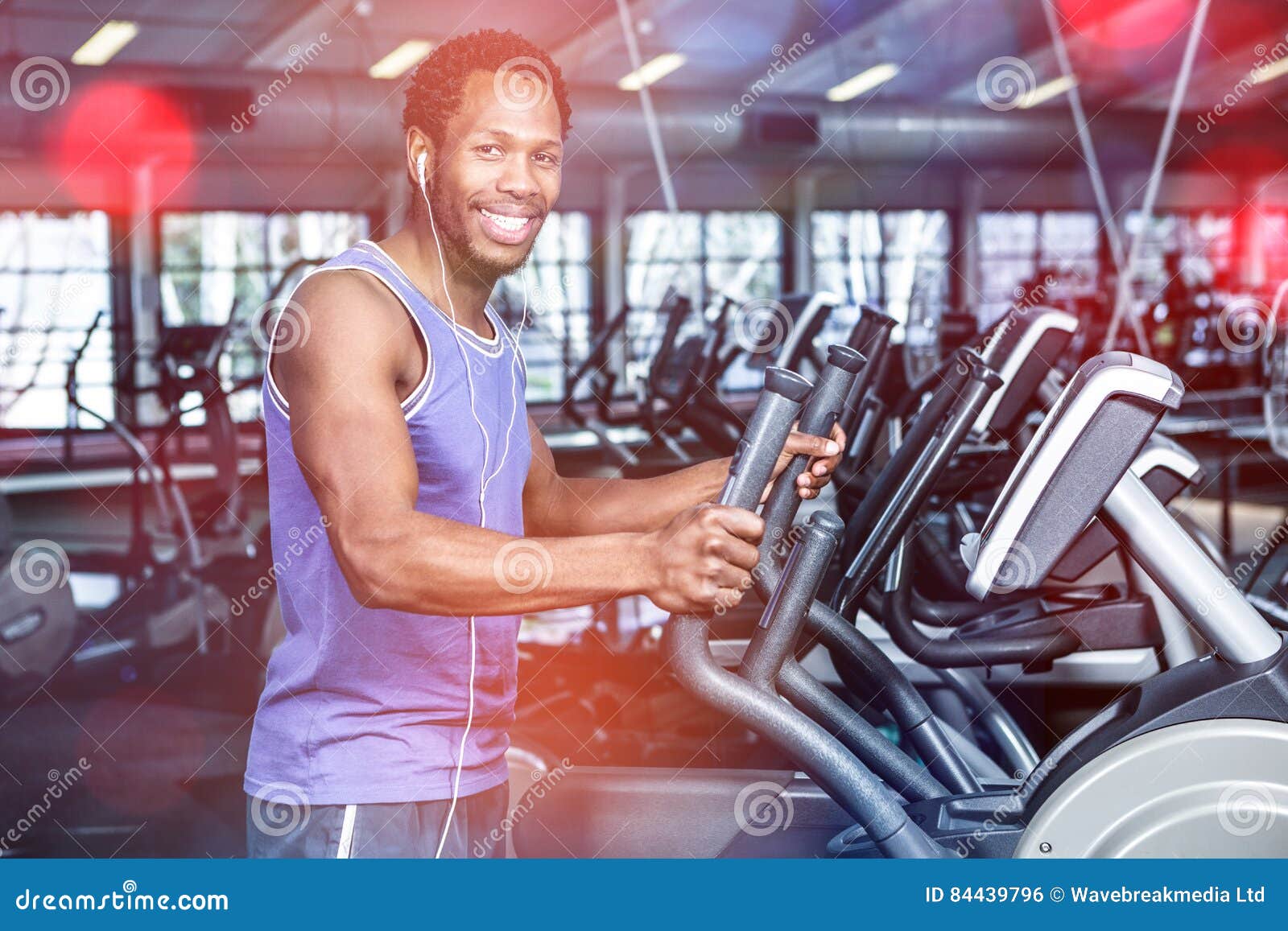 Smiling Man Working Out with Headphones Stock Photo - Image of ...