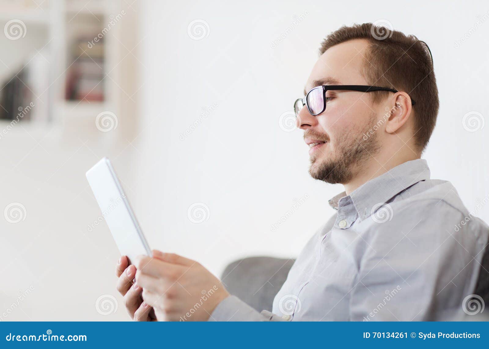 Smiling Man Working with Tablet Pc at Home Stock Image - Image of ...