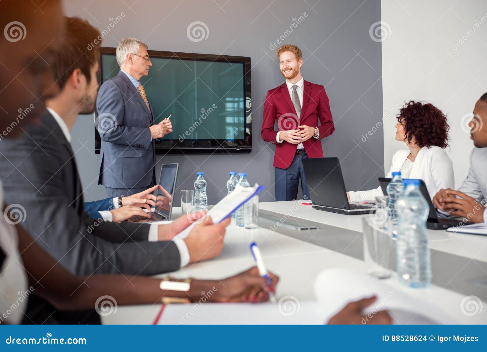 Smiling Manager in Discussion with Director of Company Stock Photo ...