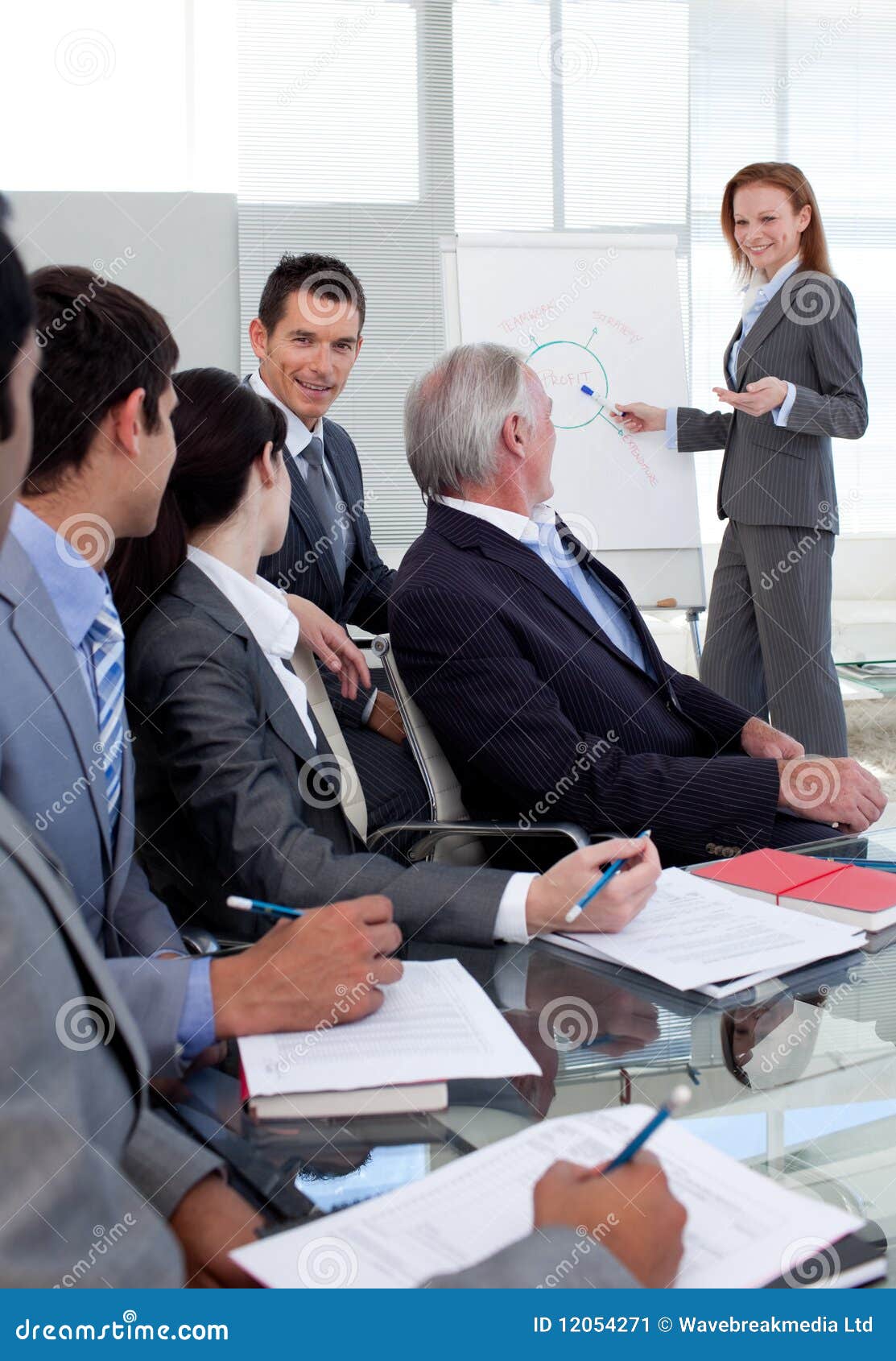 Smiling Manager Giving a Presentation To Her Team Stock Image - Image ...