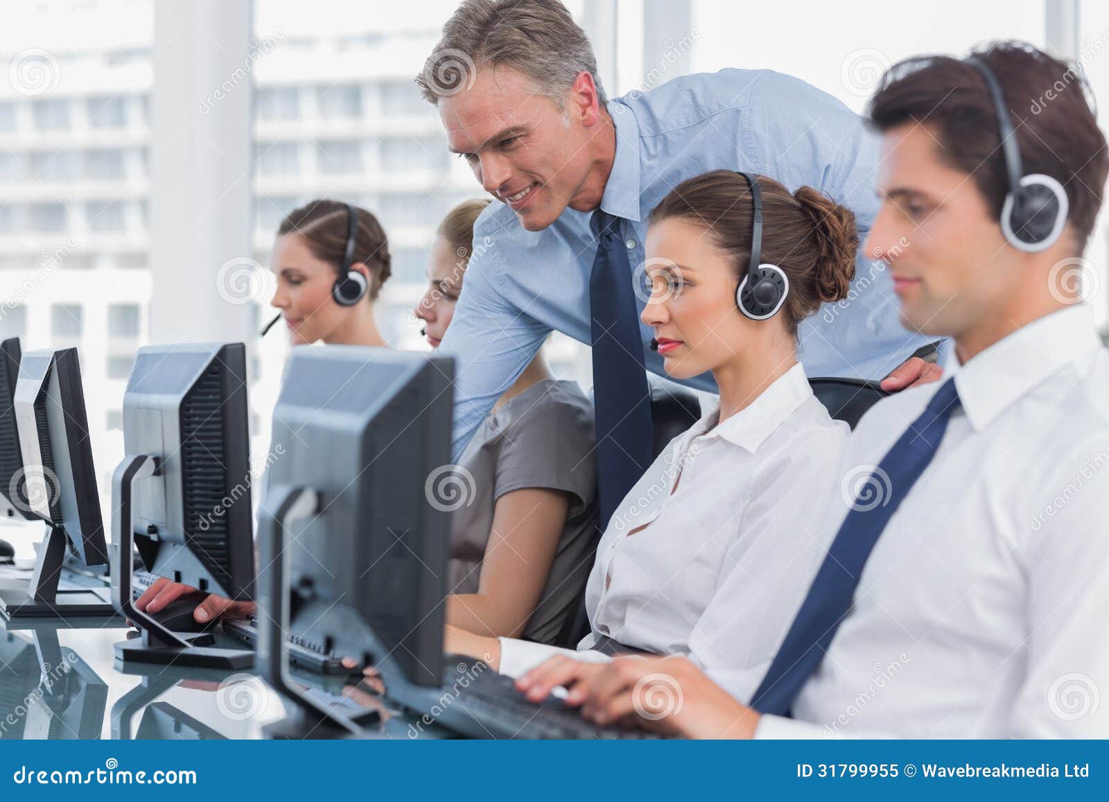 Smiling Manager Helping Call Centre Agent Stock Image - Image of classy ...