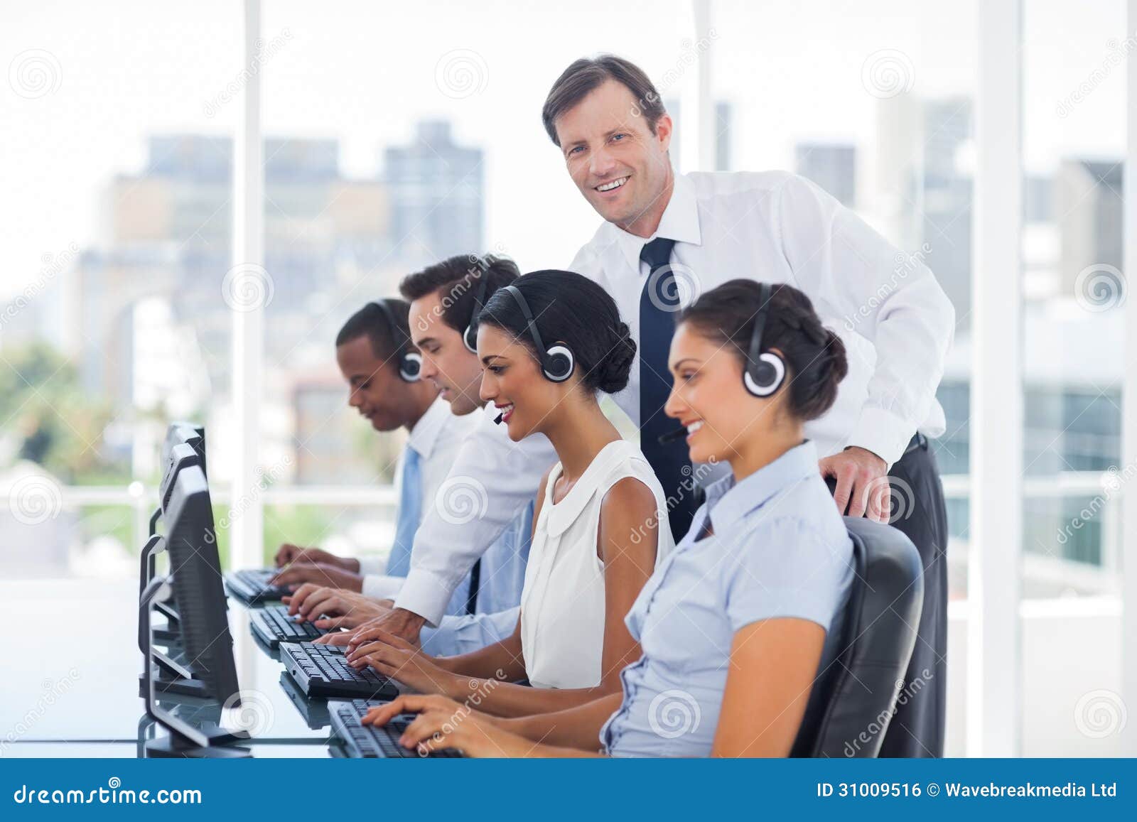 Smiling Manager Looking at Camera Stock Photo - Image of call, center ...