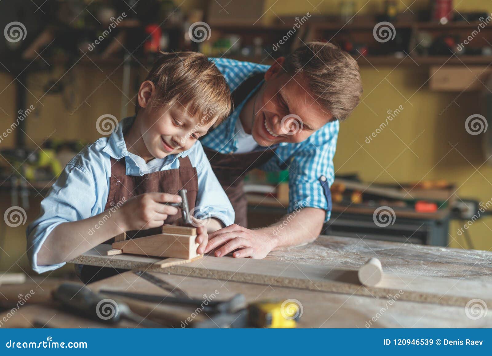 Smiling Master and a Little Boy at Work Stock Image - Image of parent ...