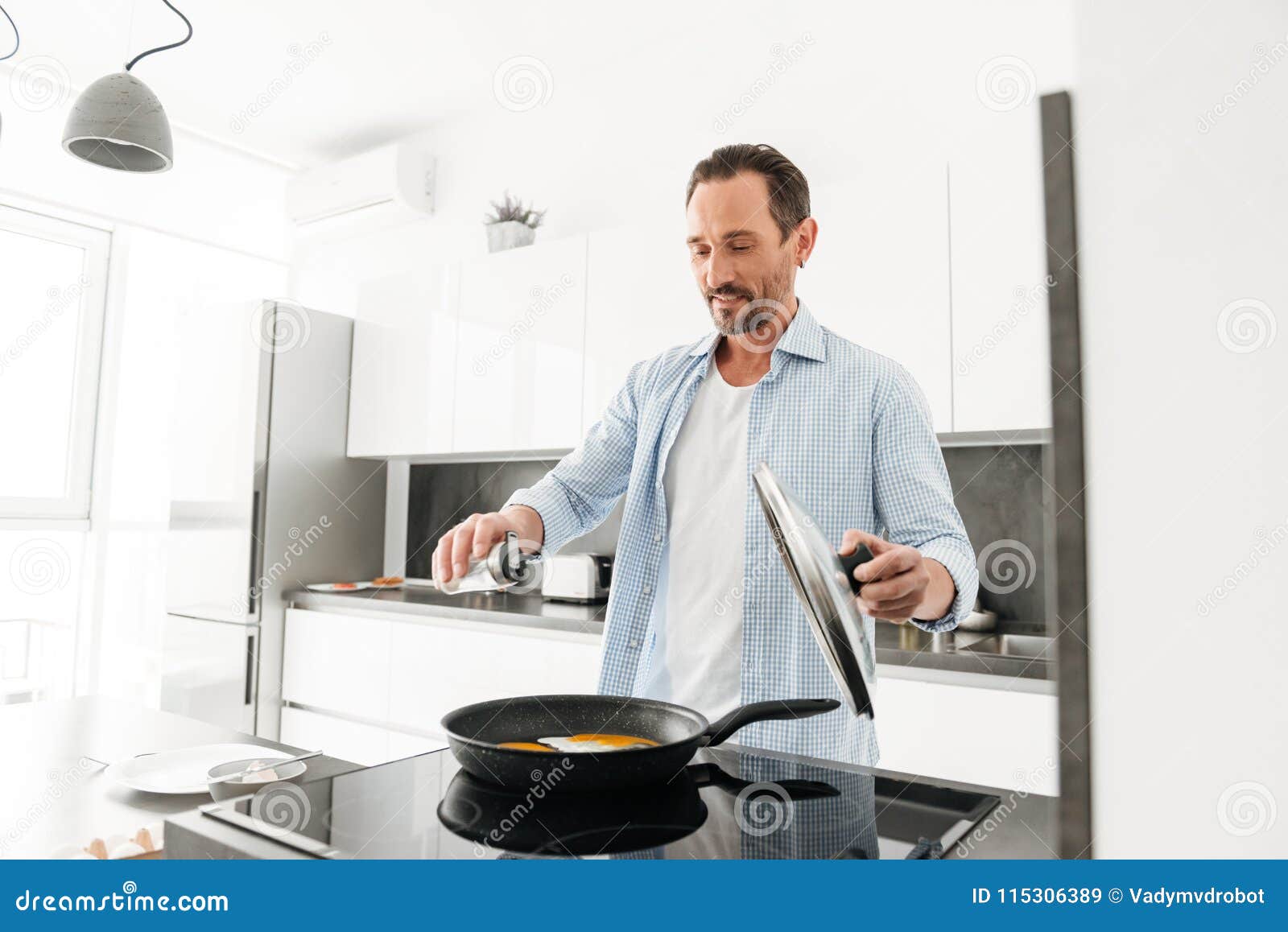 Smiling Mature Man Cooking Breakfast Stock Image - Image of person ...