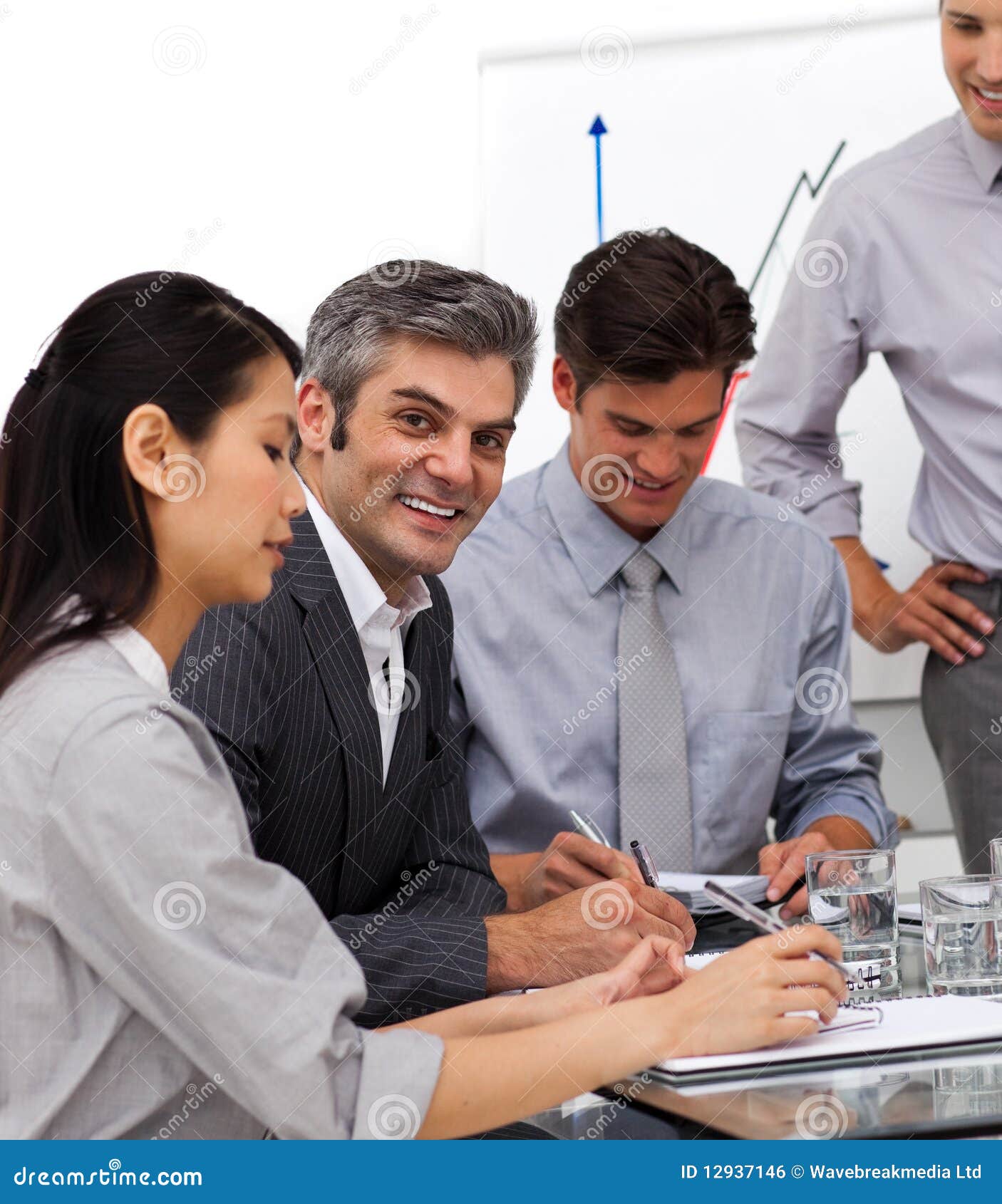 Smiling Mature Manager in a Meeting with His Team Stock Photo - Image ...
