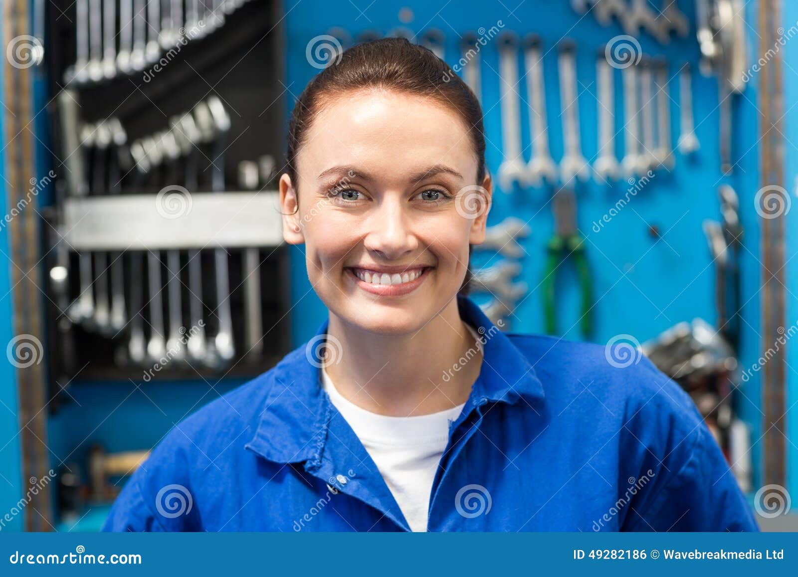 Smiling Mechanic Looking at Camera Stock Photo - Image of happy, person ...