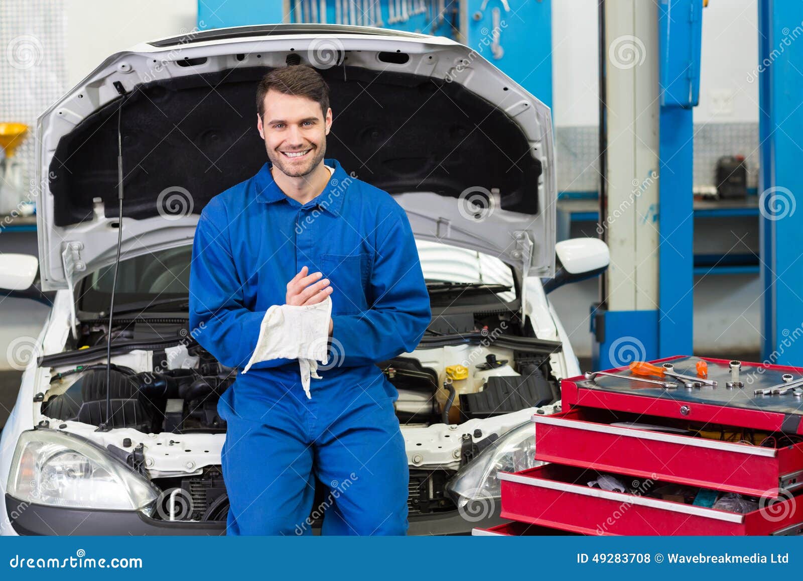 Smiling Mechanic Looking at Camera Stock Photo - Image of service ...