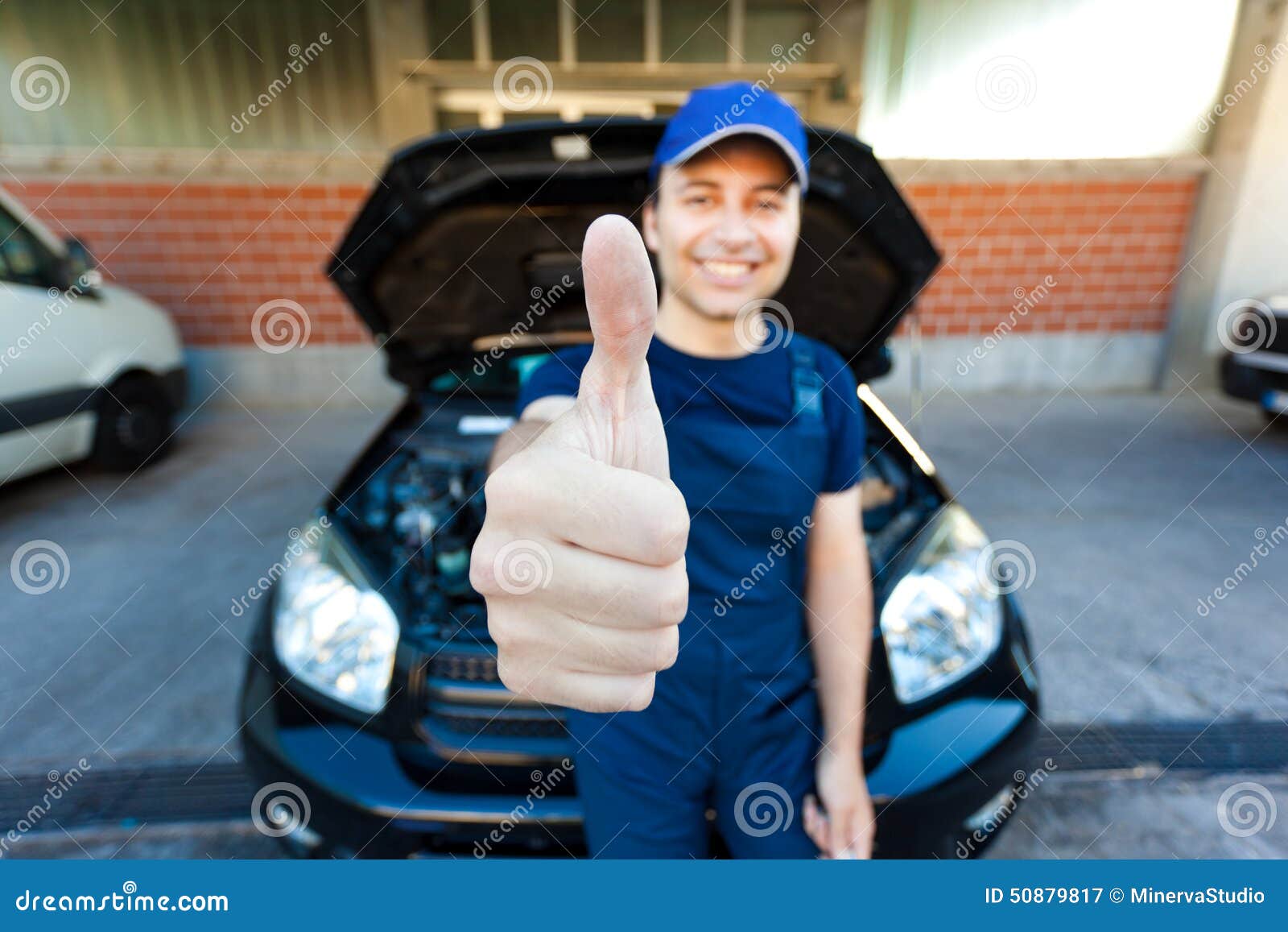 Smiling mechanic thumbs up stock image. Image of clipboard - 50879817