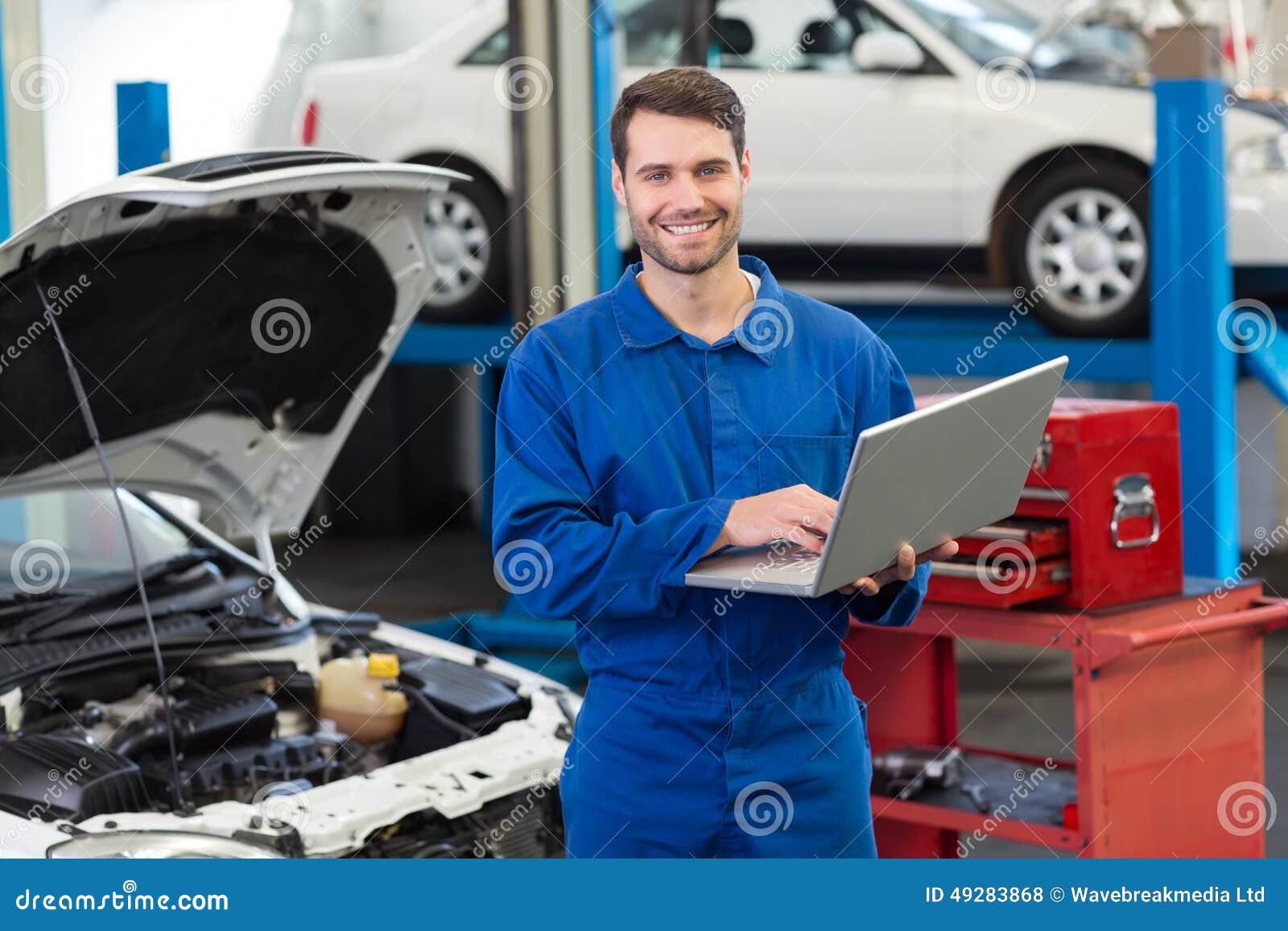 Mechanic Using Jack Stock Photography | CartoonDealer.com #632480
