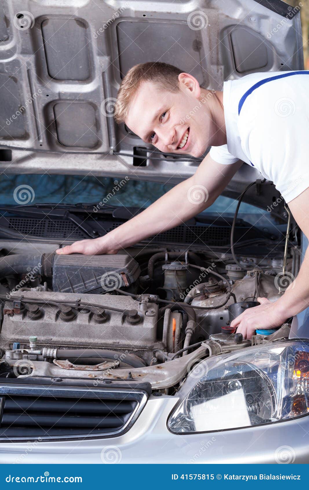 Smiling mechanic at work stock image. Image of accident - 41575815