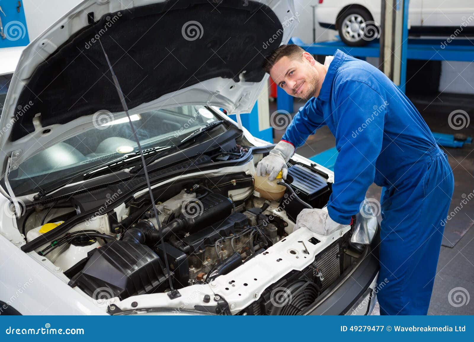 Smiling Mechanic Working on Car Stock Image - Image of auto, garage ...