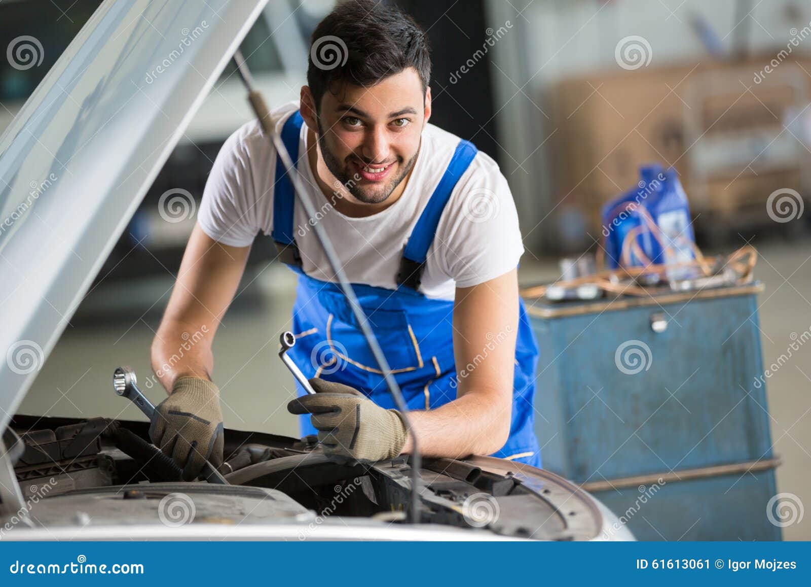 Smiling Mechanic Working on Engine Stock Image - Image of repair, auto ...