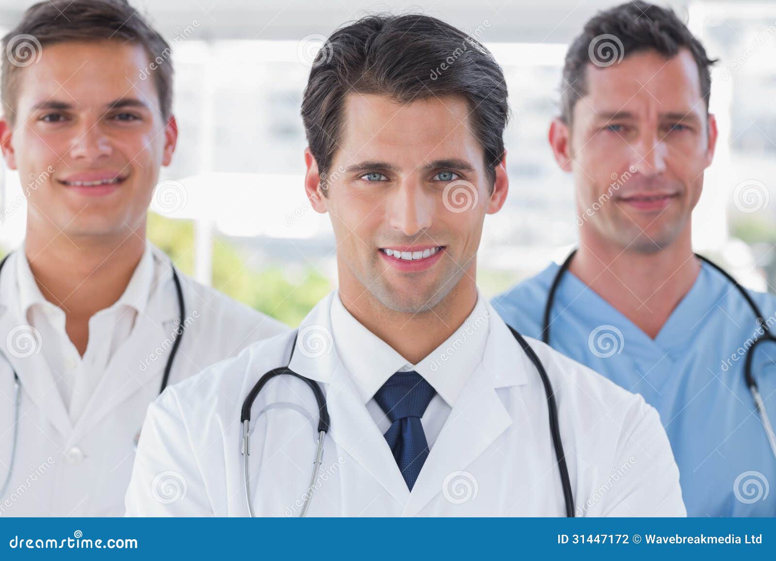 Smiling Medical Team Standing Stock Photo - Image of service, employees ...