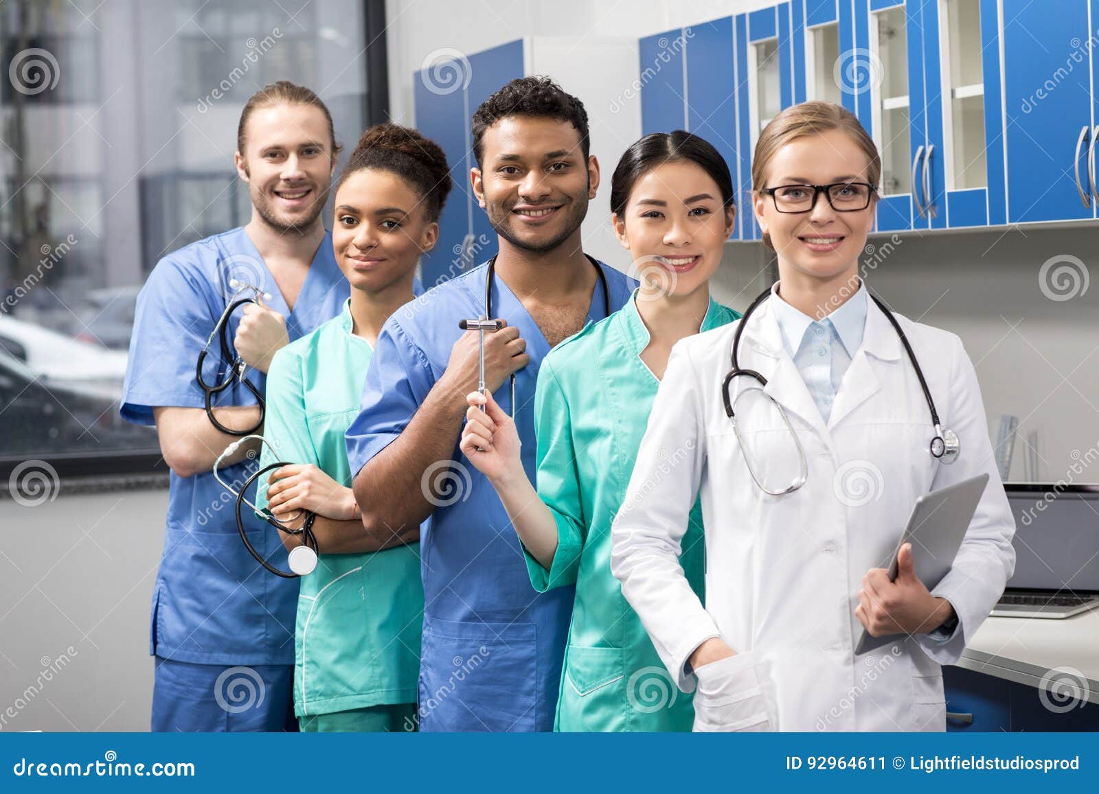 Smiling Medical Workers with Equipment in Laboratory Stock Image ...