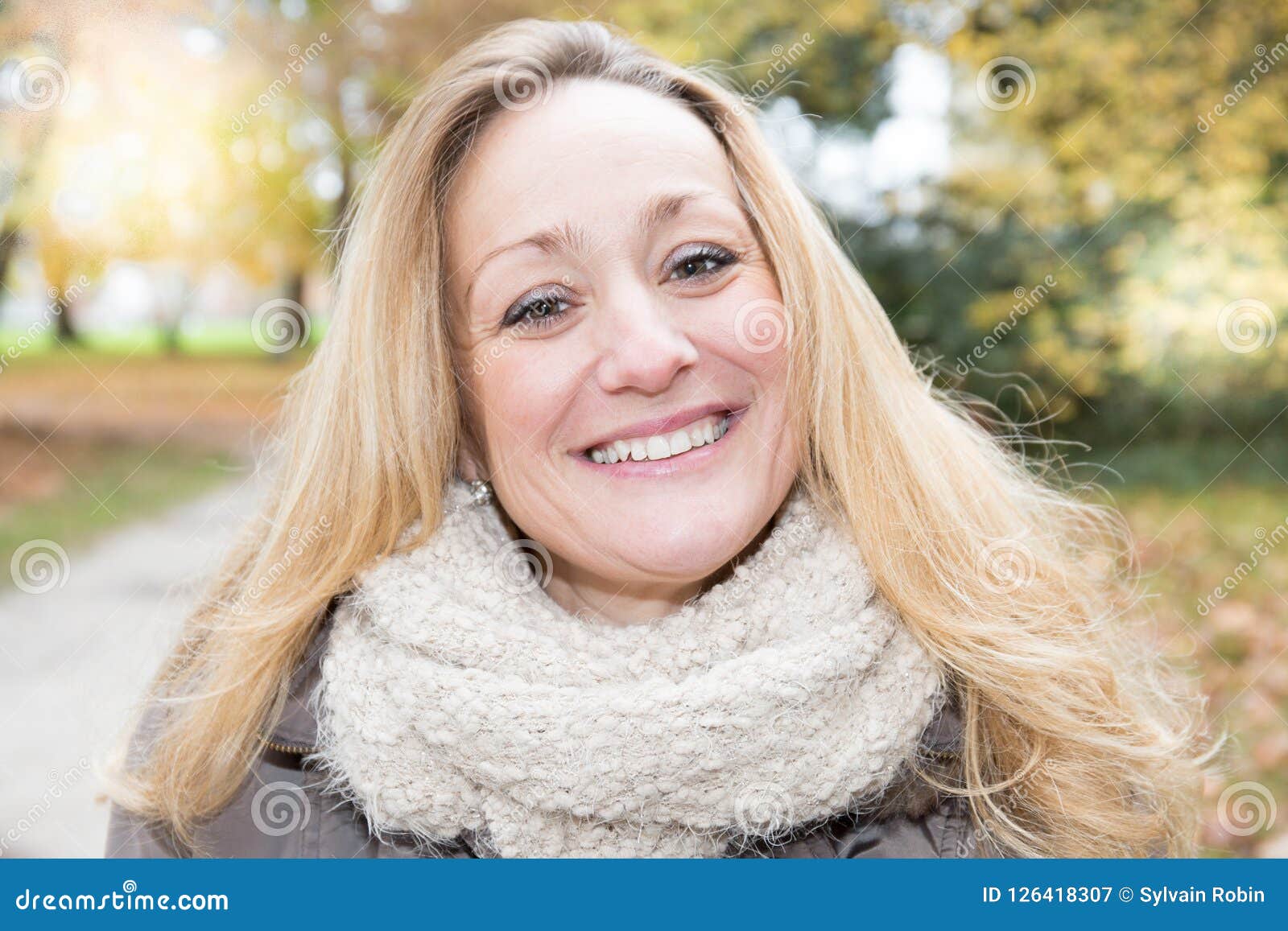 Smiling Middle Aged Blonde Woman Outdoors In Autumn Stock Image Image