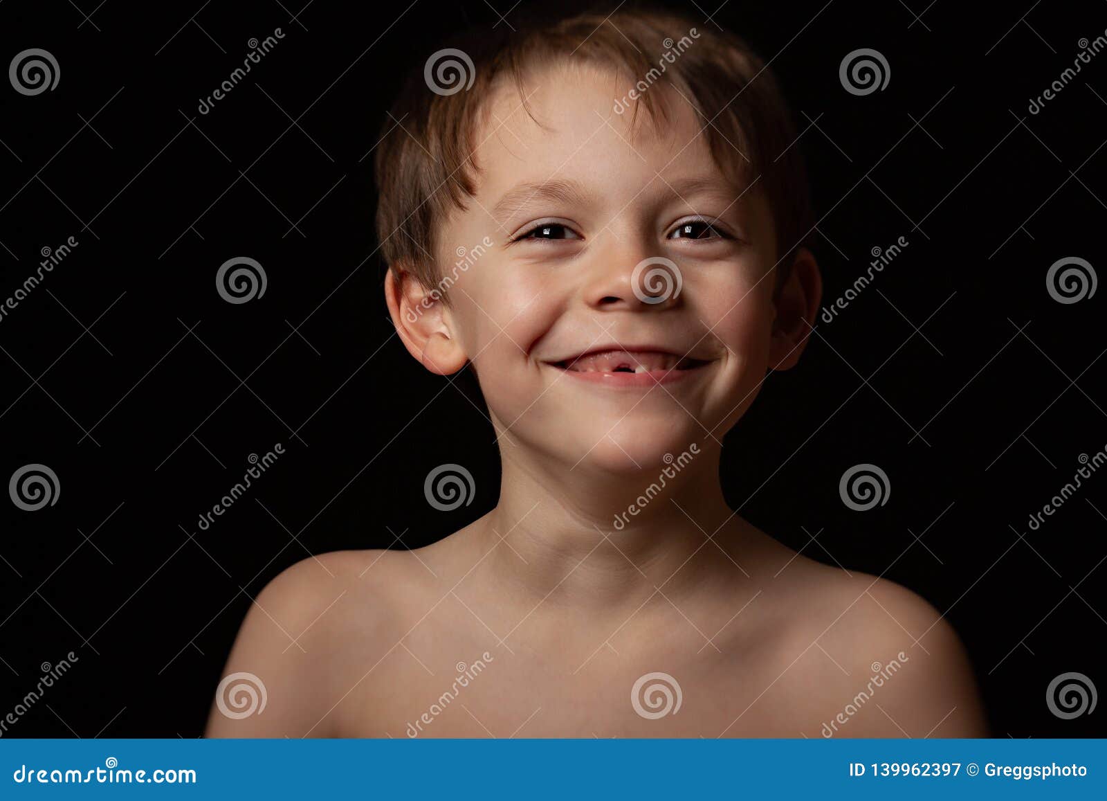 Smiling mising tooth boy stock image. Image of elementary - 139962397