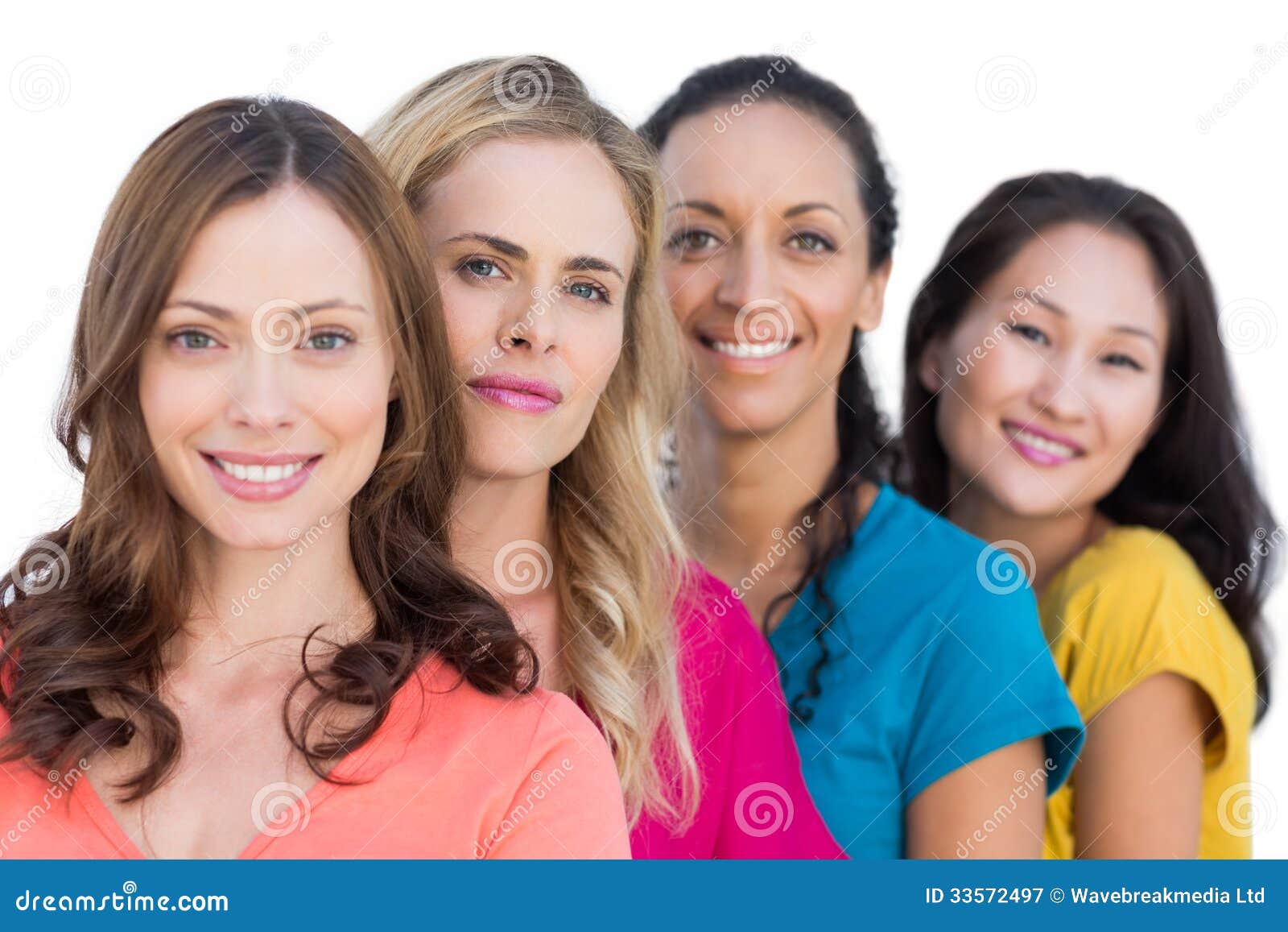 Smiling Models in a Line Posing with Colorful T Shirts Stock Image ...