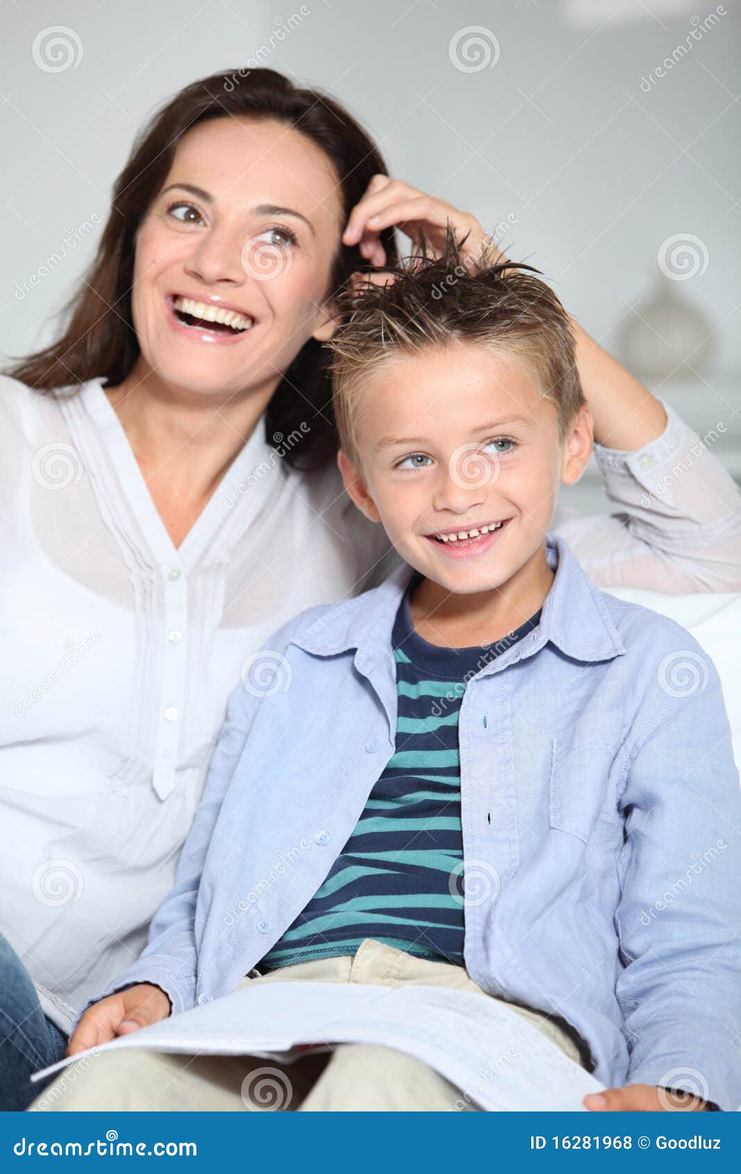 Smiling mother and child stock photo. Image of reading - 16281968