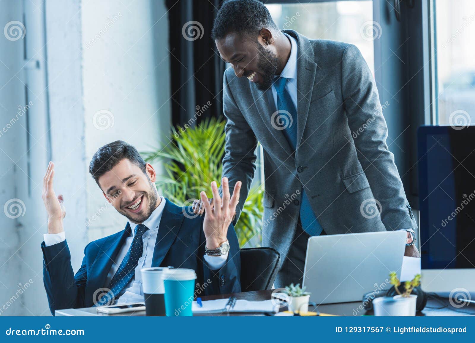Smiling Multicultural Businessmen Talking Stock Image - Image of symbol ...