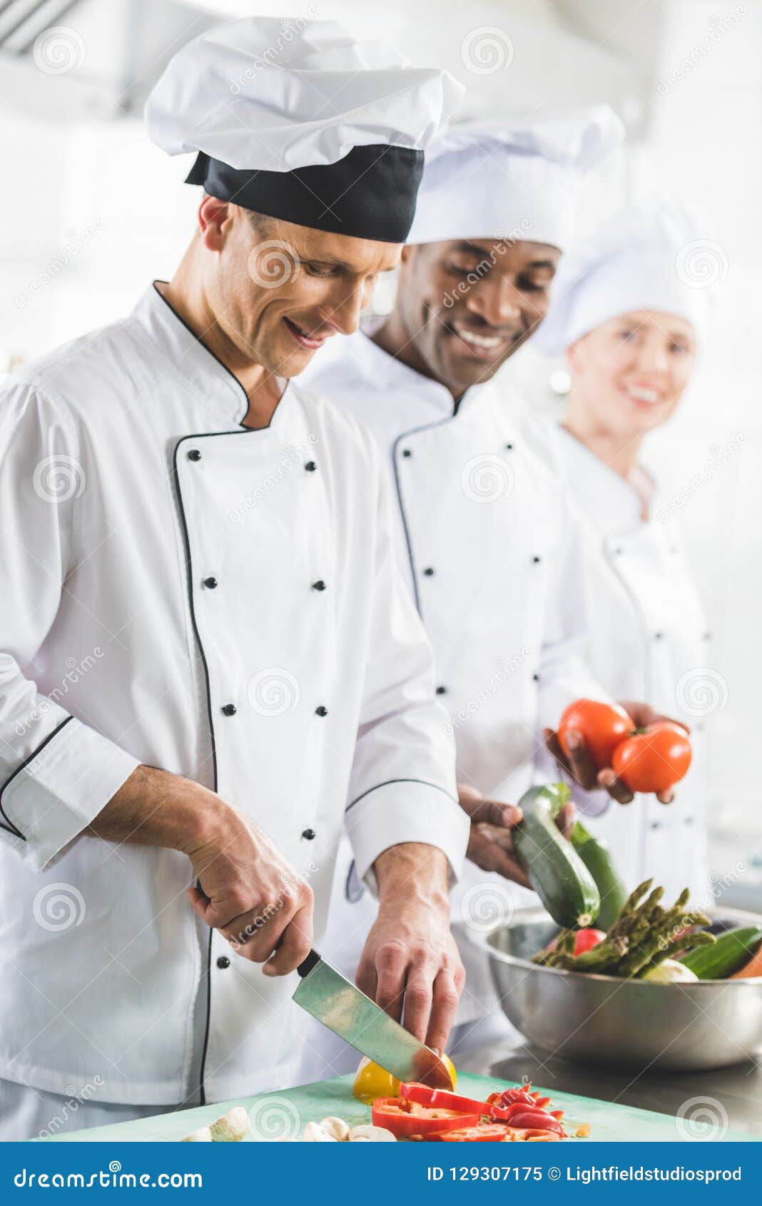 Smiling Multicultural Chefs Cooking Stock Image - Image of preparation ...