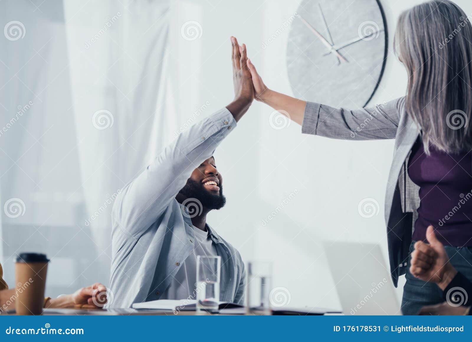 Multicultural Colleagues Giving High Five in Stock Image - Image of ...