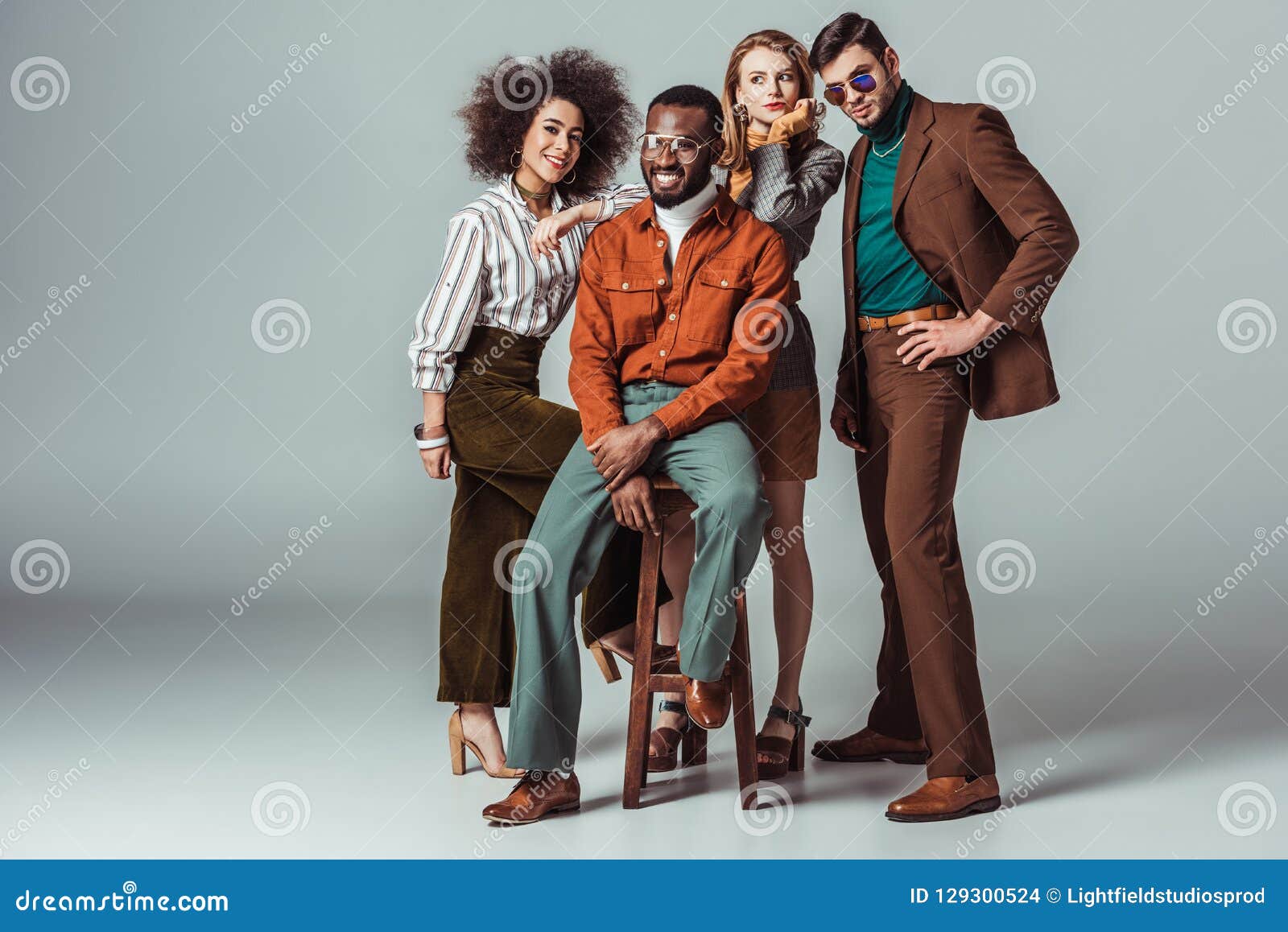 Smiling Multicultural Retro Styled Friends Looking at Camera Stock ...