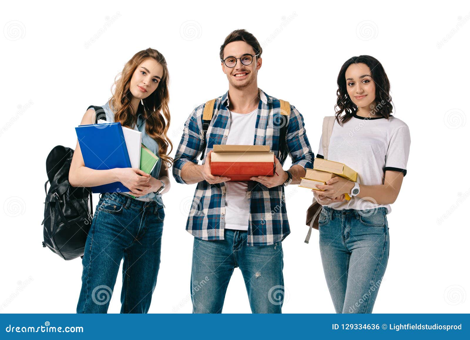 Smiling Multicultural Students with Books Looking at Camera Stock Photo ...