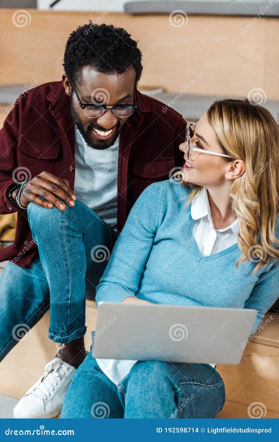Multicultural Students in Glasses Using Laptop in Lecture Hall Stock ...